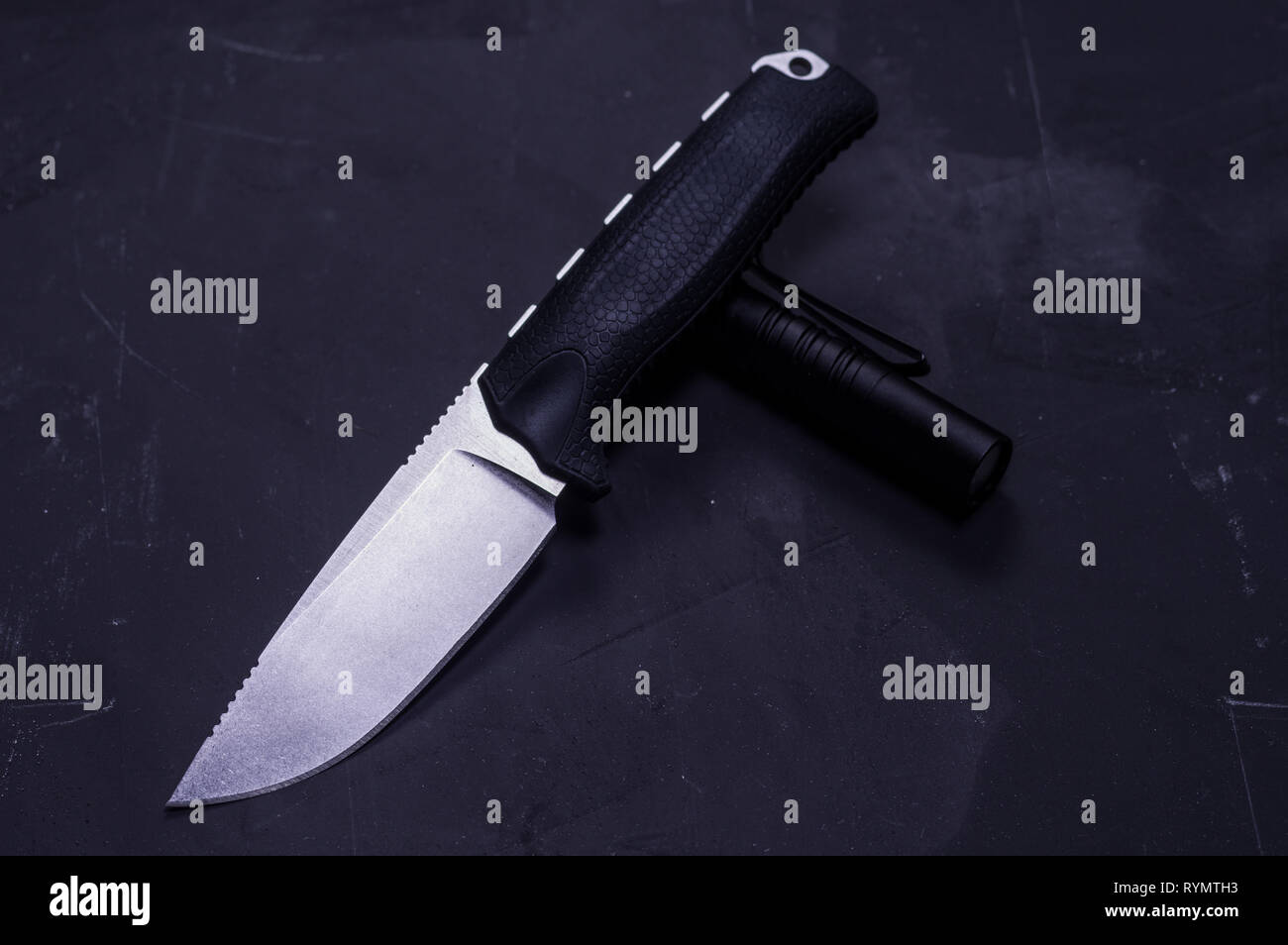 The brilliant knife of the hunter. Glitter and shadow Stock Photo - Alamy