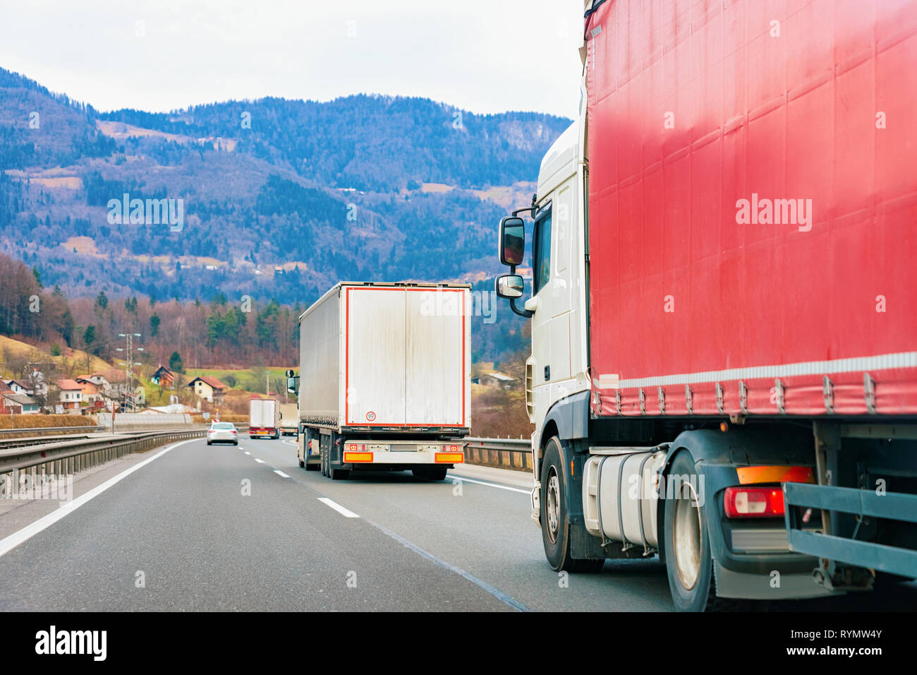 Trucks on road. Trucker on highway. Lorry doing logistics work. Semi ...