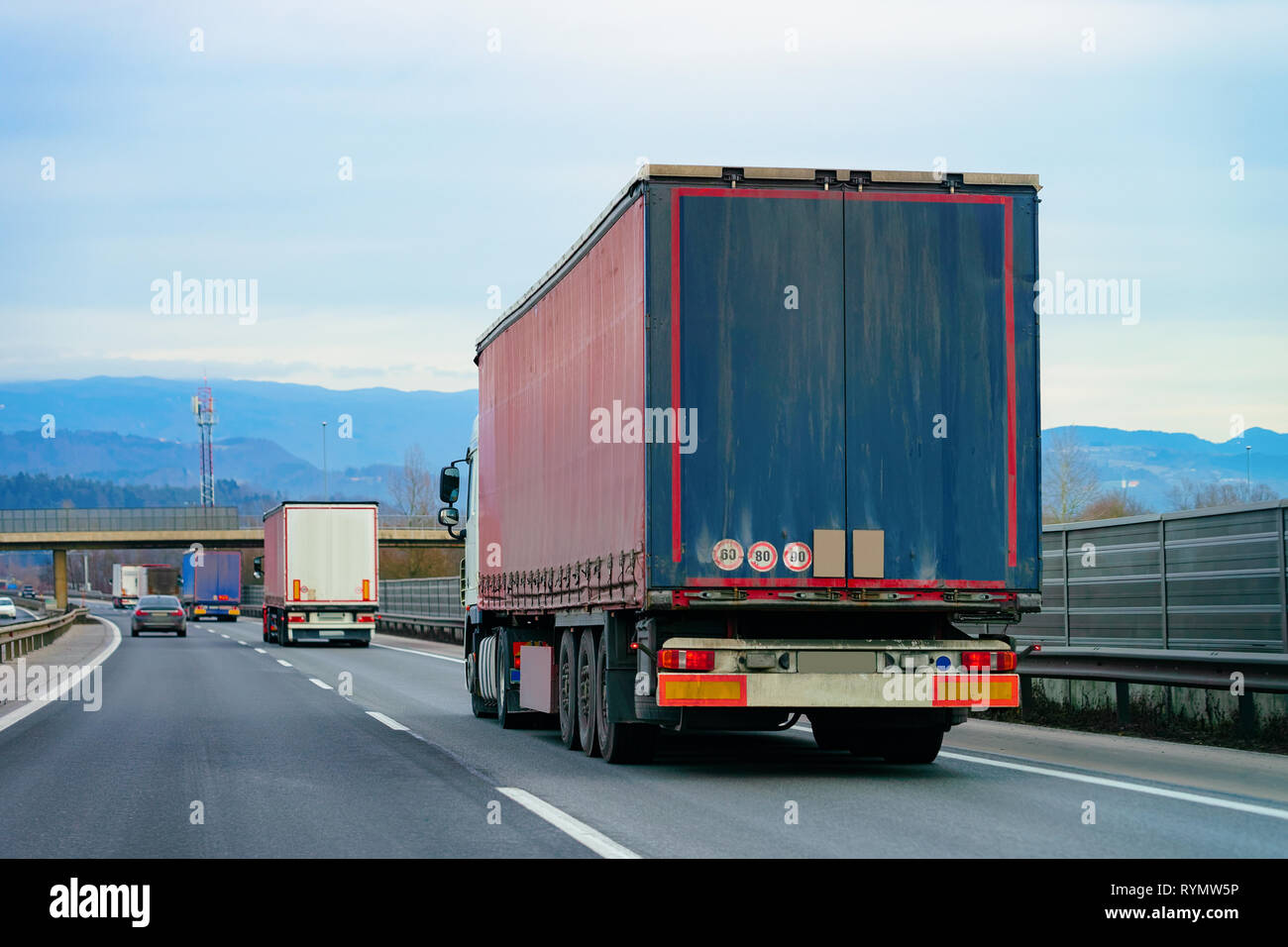 Trucks in road. Trucker in highway. Lorry doing logistics work. Semi ...