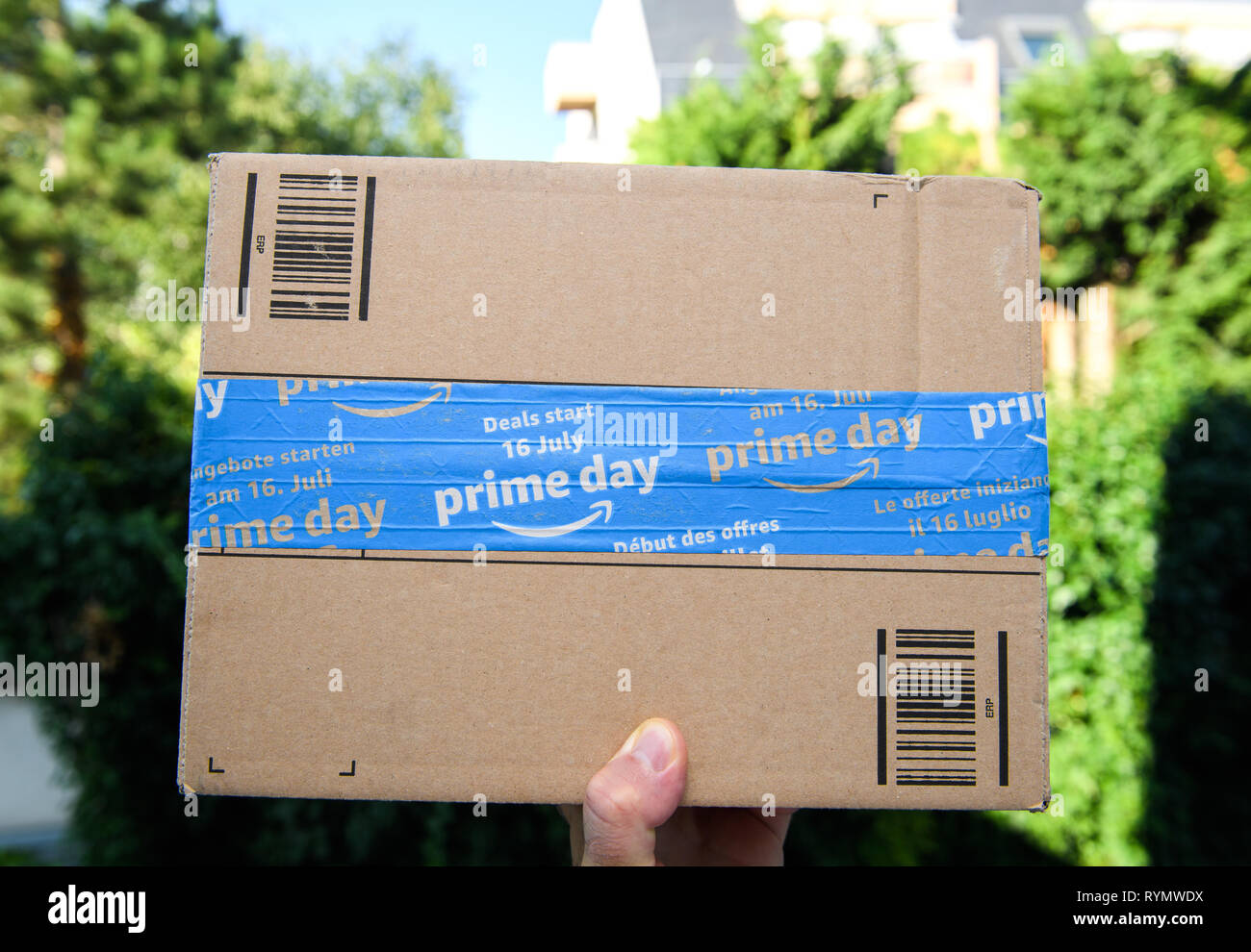 Paris, France - Jul 11, 2018: Man hand holding against city green ...