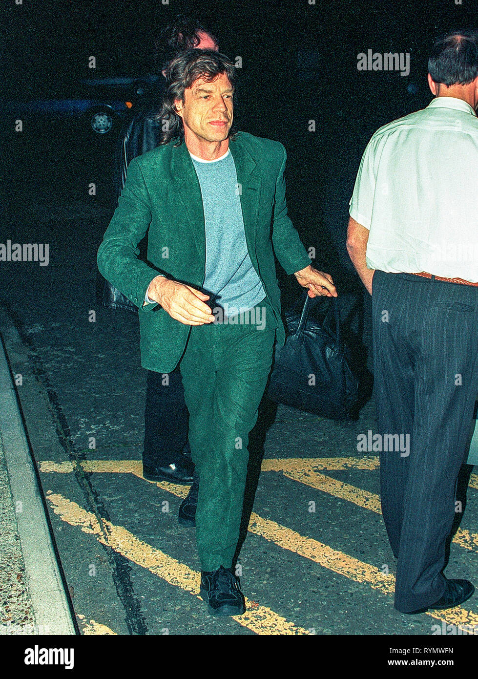 Rolling Stones lead singer Mick Jagger arriving at London's Heathrow ...