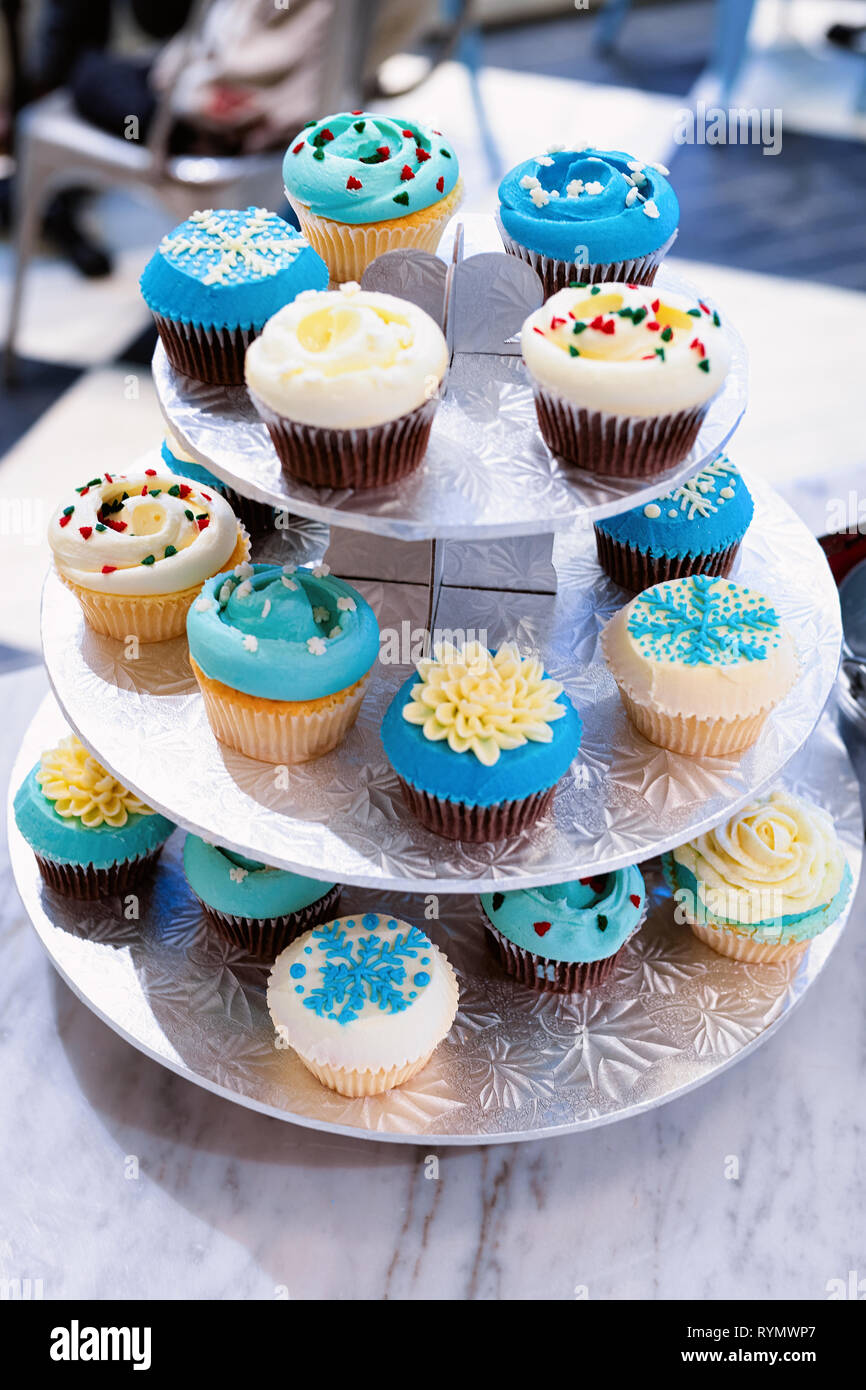 Blue and white cupcakes in a plate Stock Photo - Alamy