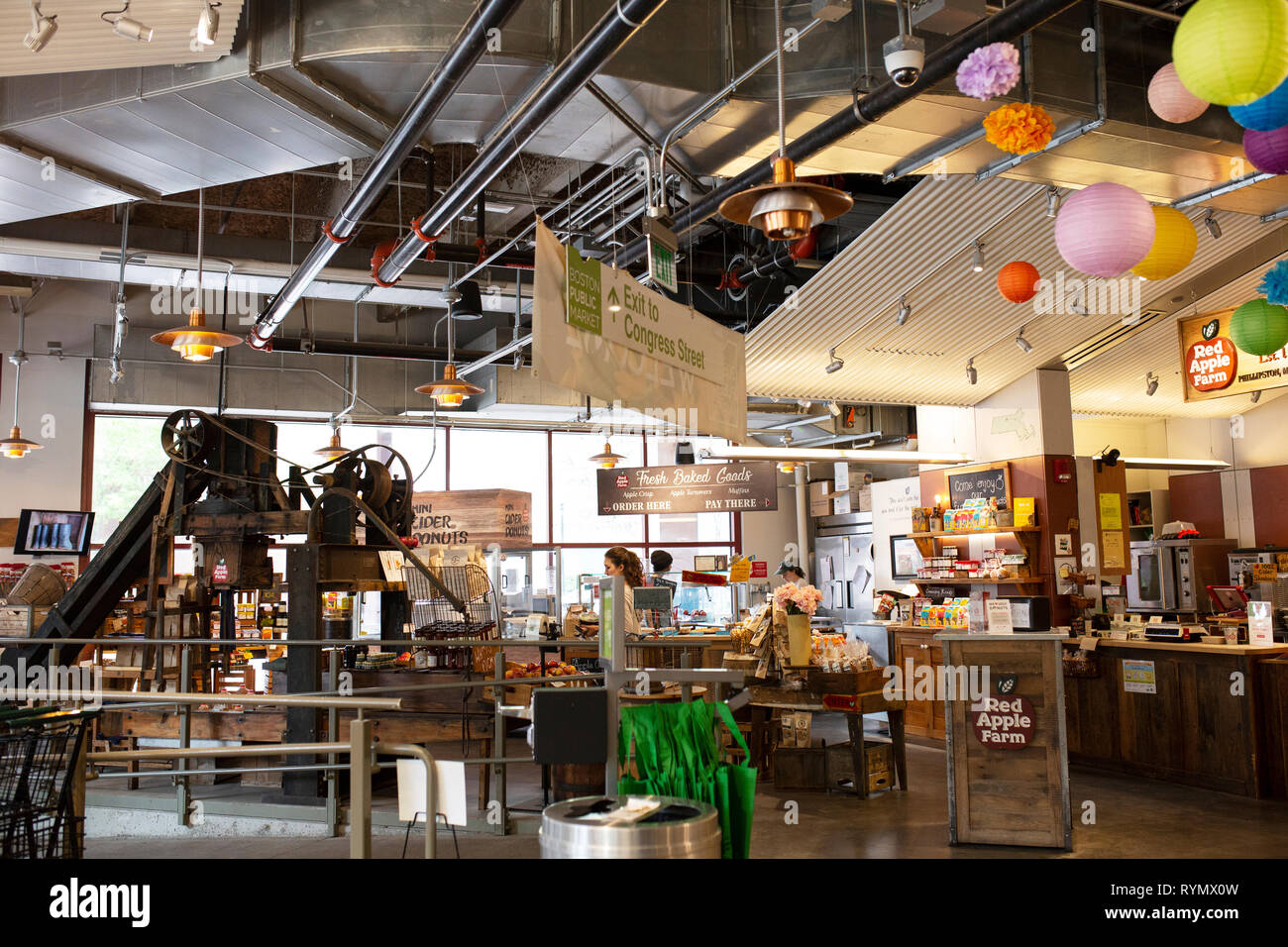 Apple farm stand and cider donut maker inside the Boston Public Market ...