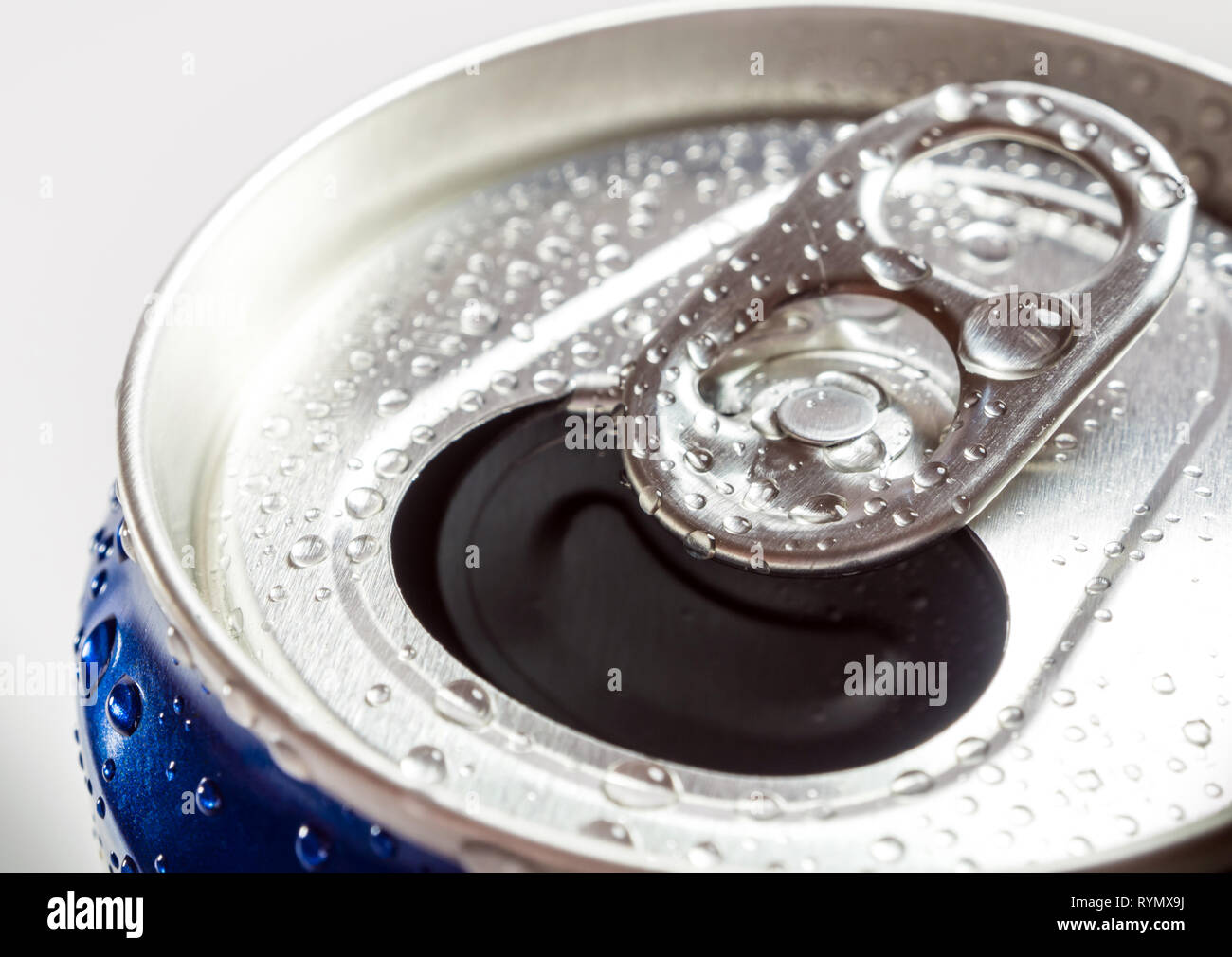 Condensation refreshing water droplets on the fresh cold soft drink can ...