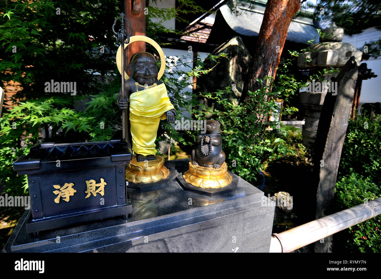 NAGANO, JAPAN - JULY 18, 2018 : Black Jizo Bosatsu and praying raccoon ...