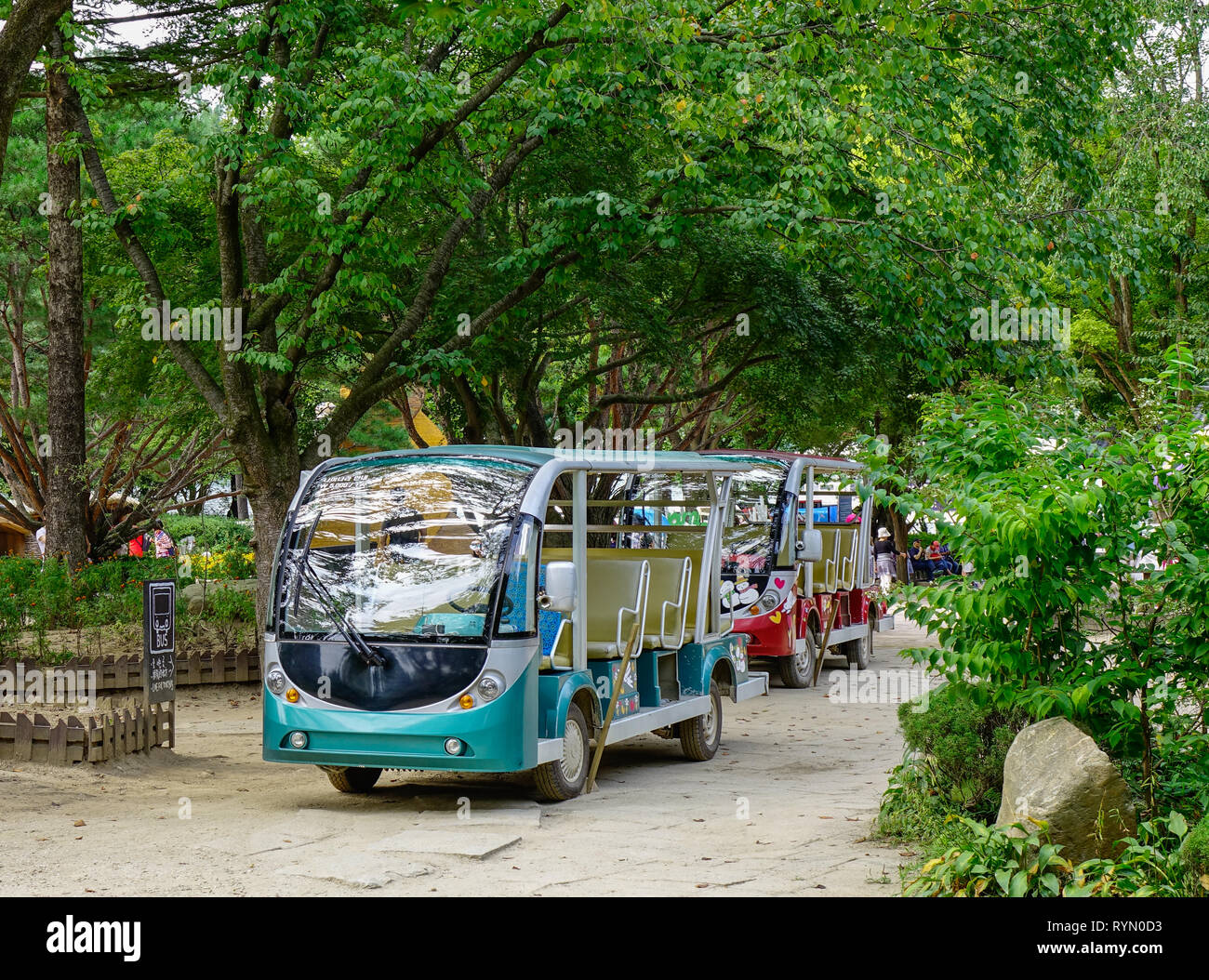 Nami, South Korea - Feb 6, 2015. Electric carts waiting for passengers ...