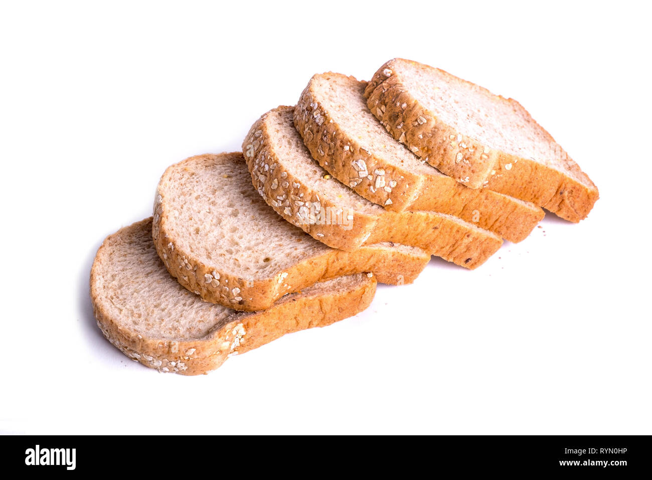 Slice whole wheat bread isolated on white background Stock Photo - Alamy
