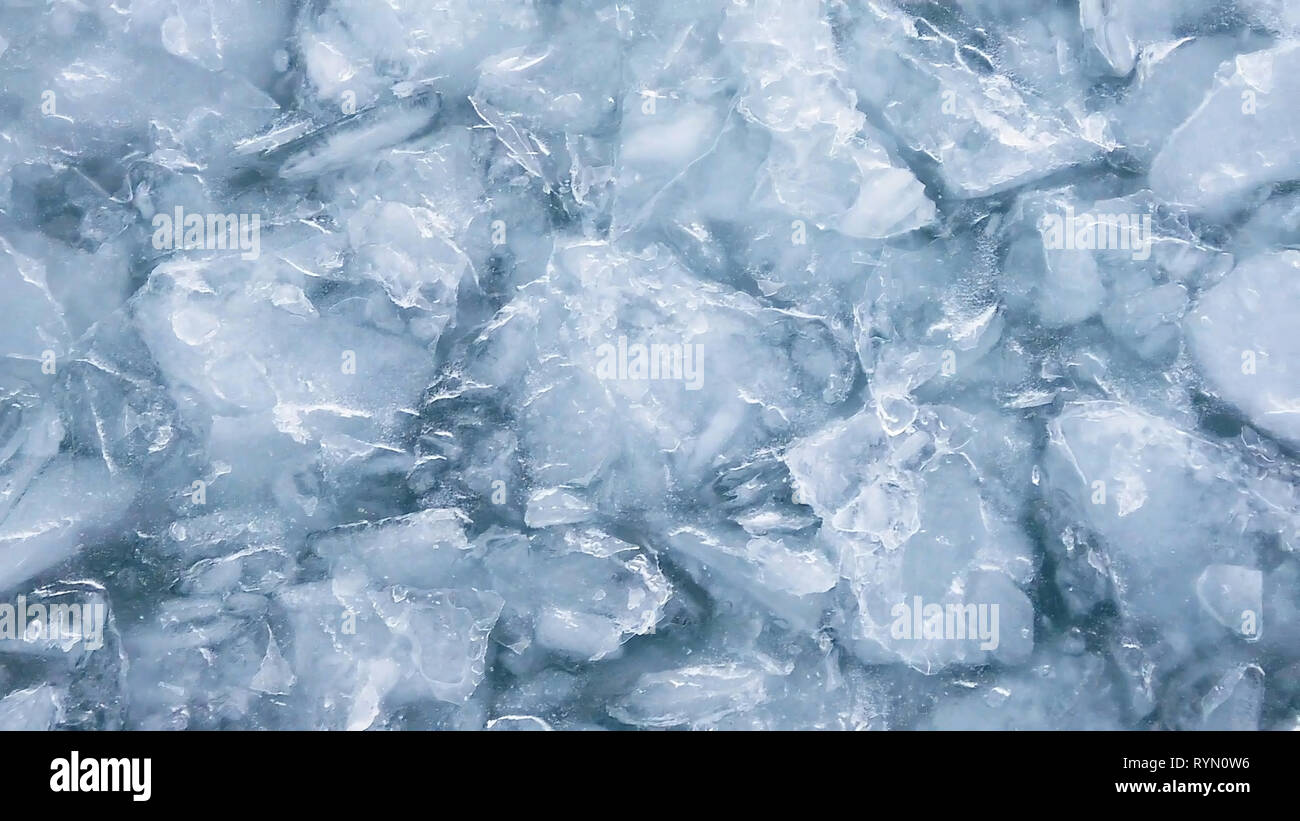 Close up of the ocean frozen over. melting and cracking. Climate change ...