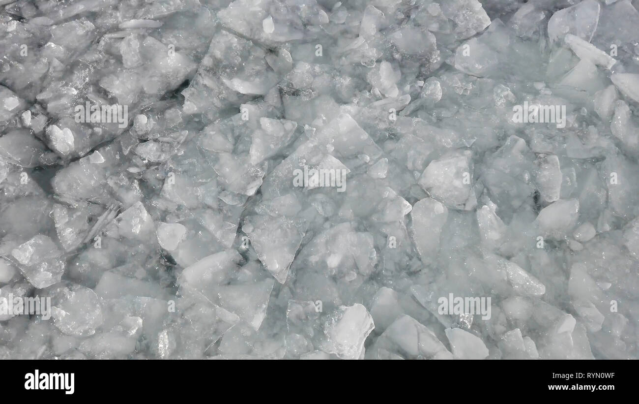 Close up of the ocean frozen over. melting and cracking. Climate change ...