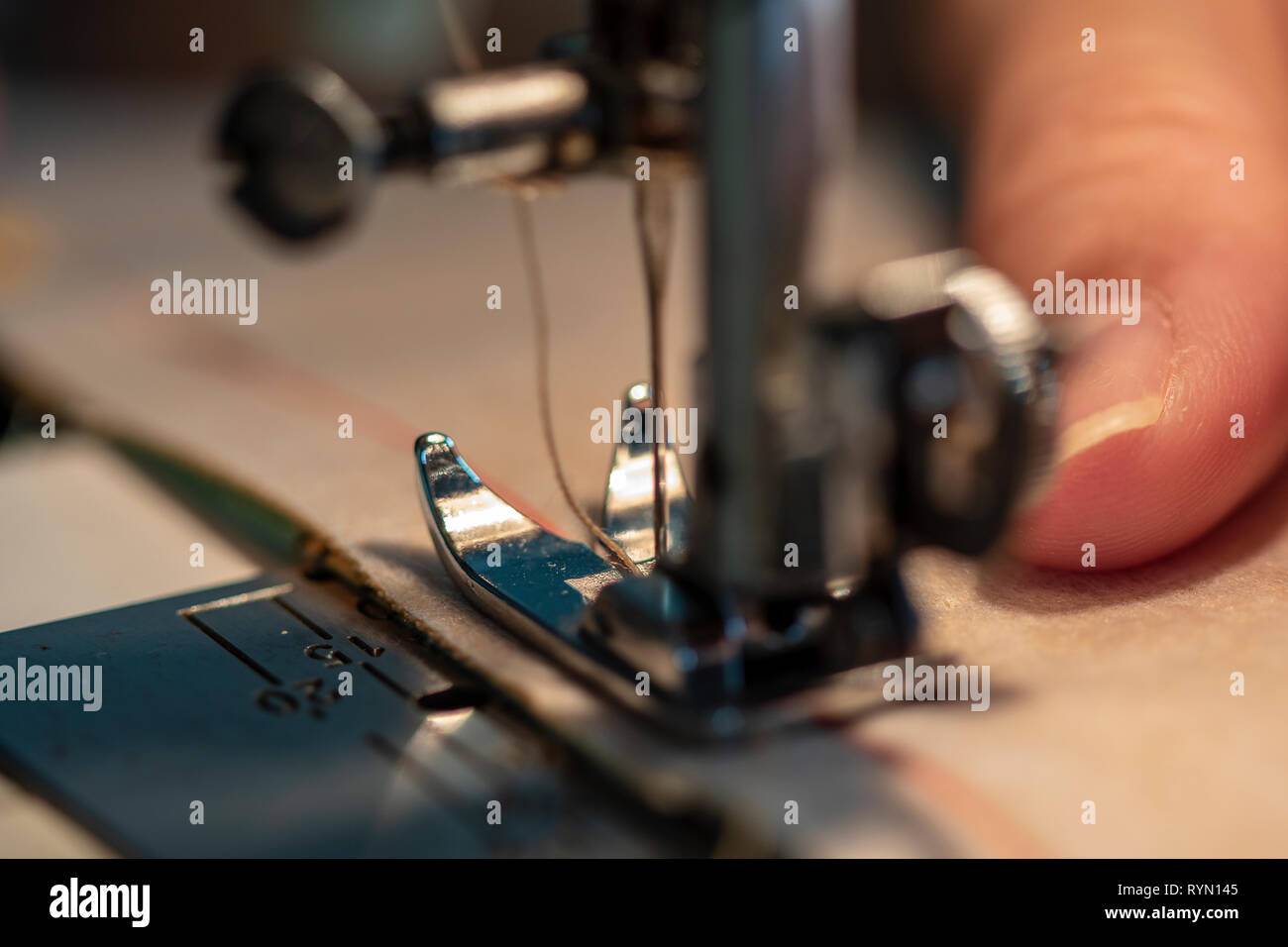 Close up view of sewing machine background Stock Photo - Alamy
