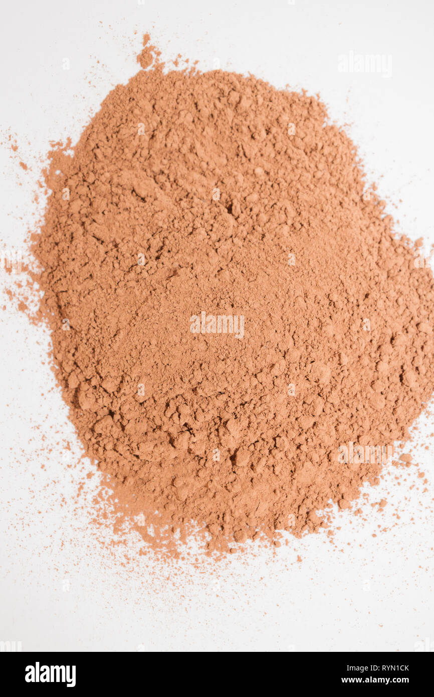Dry cocoa powder poured in a mixing bowl Stock Photo - Alamy