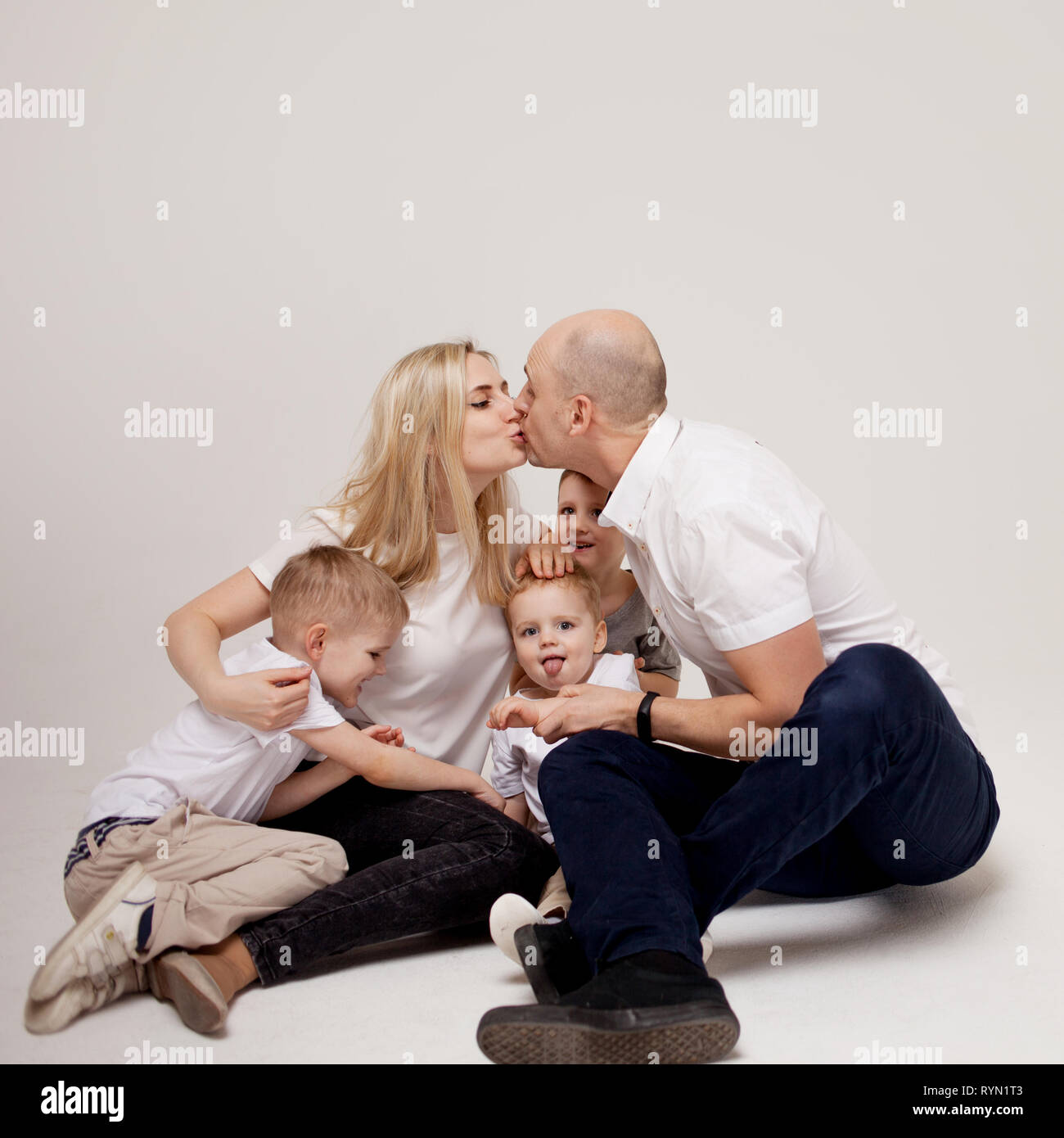 Big and cheerful family, mom dad and three sons. Happy together. family ...