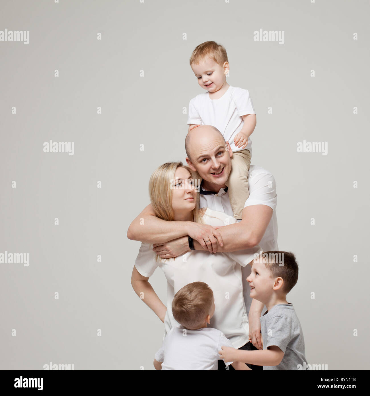 Big and funny family, mom dad and three sons. Happy together. family ...