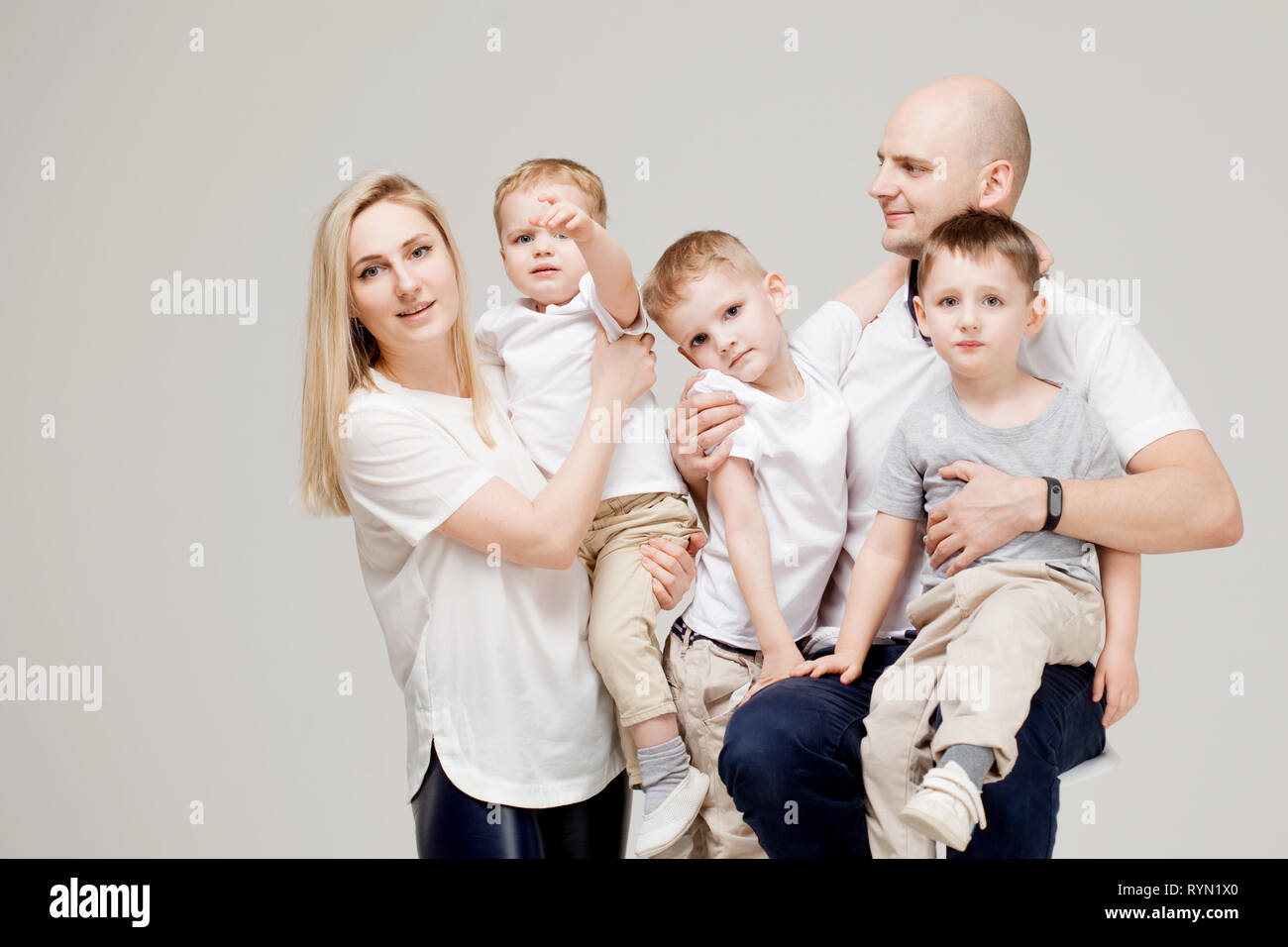 Big and cheerful family, mom dad and three sons. Happy together. family ...