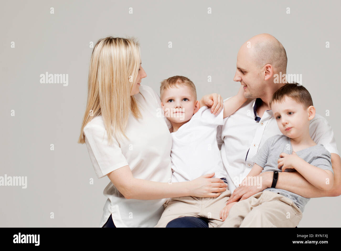 Big family, parents and sons. Mom dad and two boys, young family ...