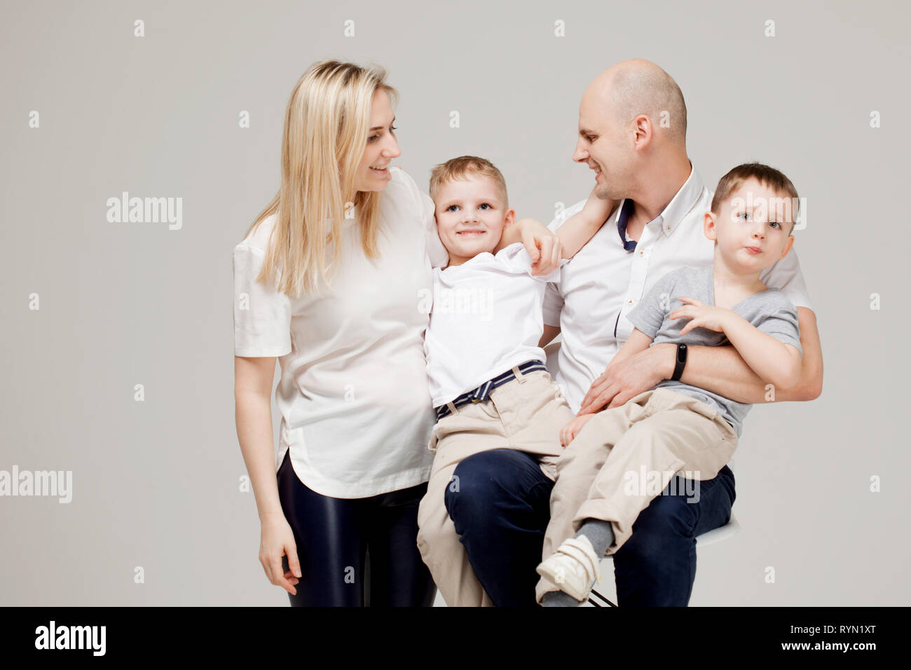 Big family, parents and sons. Mom dad and two boys, young family ...