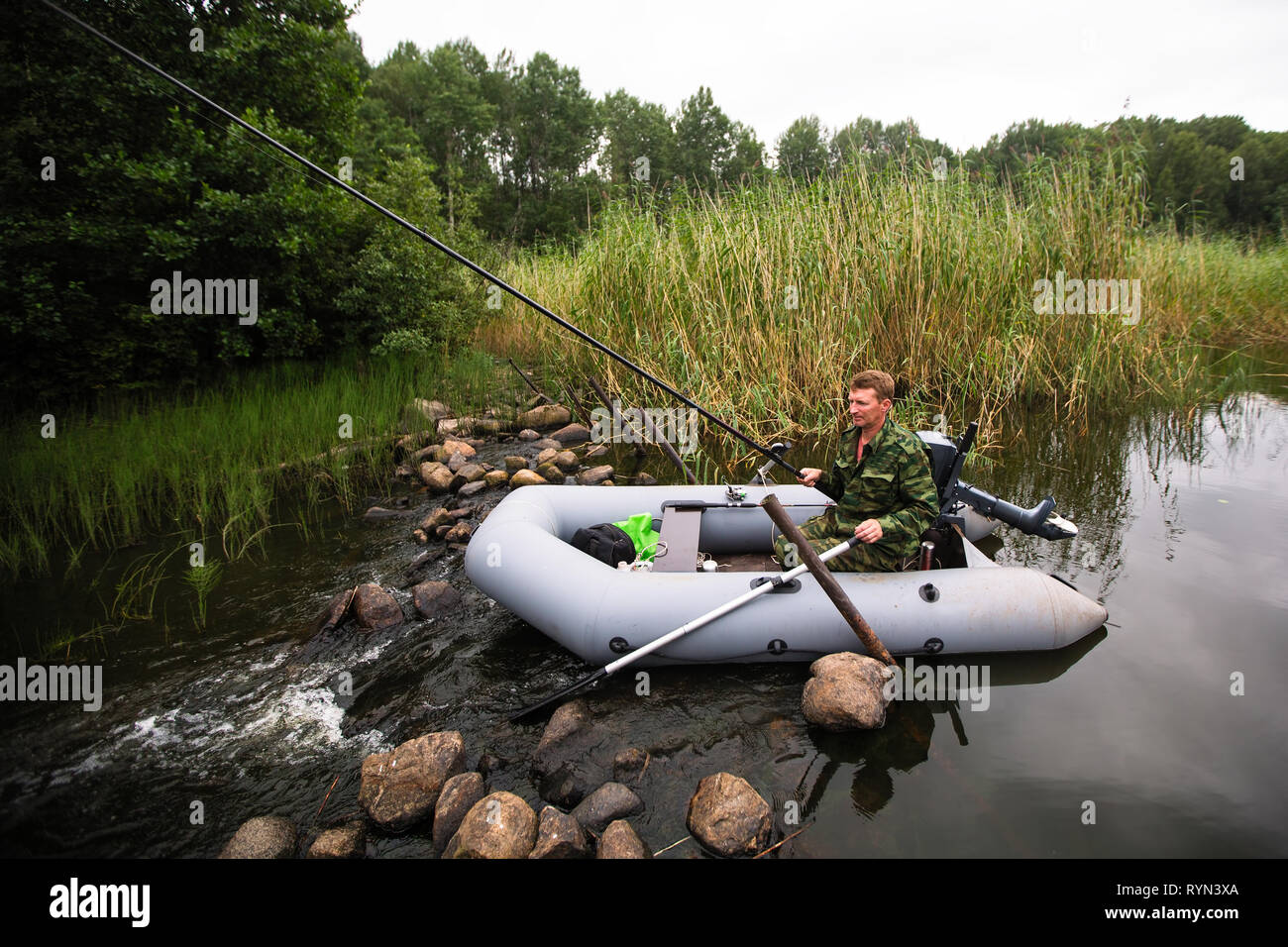 Dinghy Person Fisherman High Resolution Stock Photography and Images ...