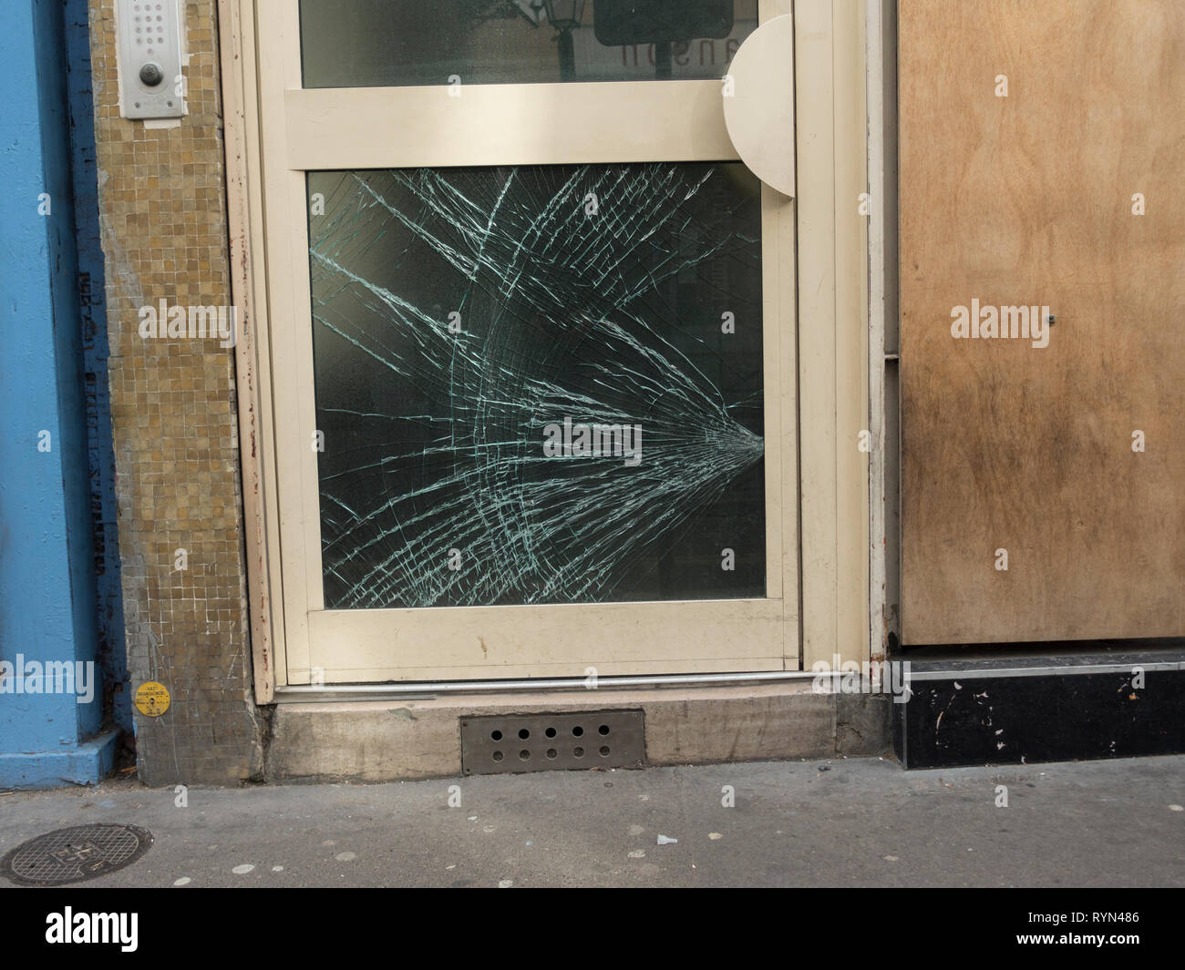 Broken door window Stock Photo - Alamy