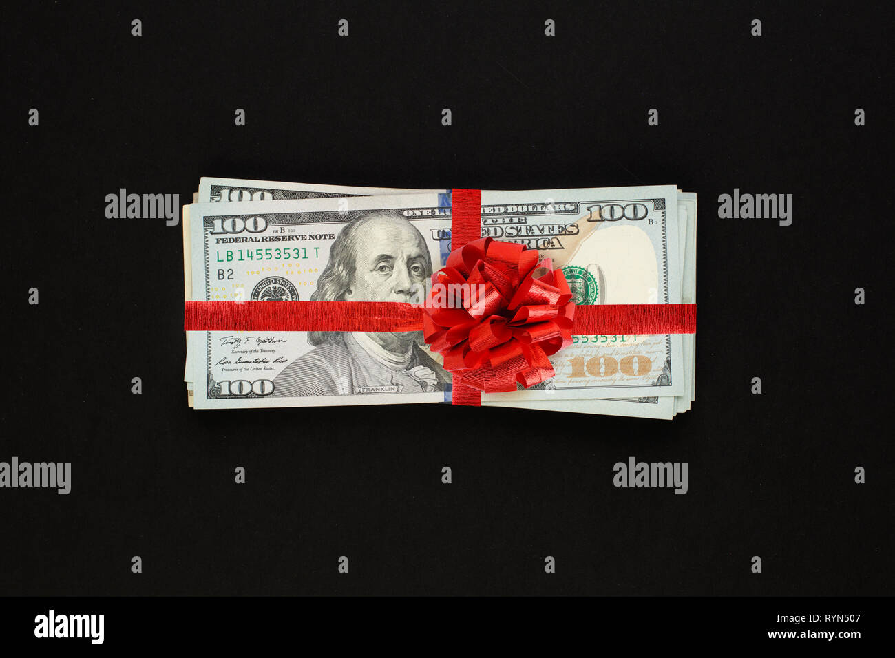 100 dollar bill on black hi-res stock photography and images - Alamy