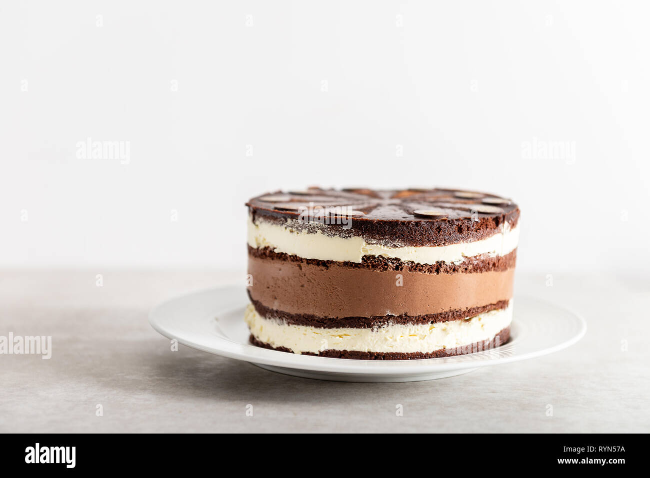 Belgian Chocolate Layered Gateau. Layers of moist choco sponge, vanilla ...