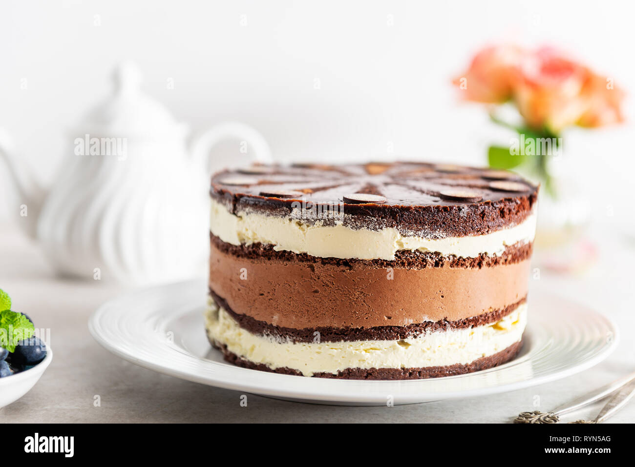 Belgian Chocolate Layered Gateau. Layers of moist choco sponge, vanilla ...
