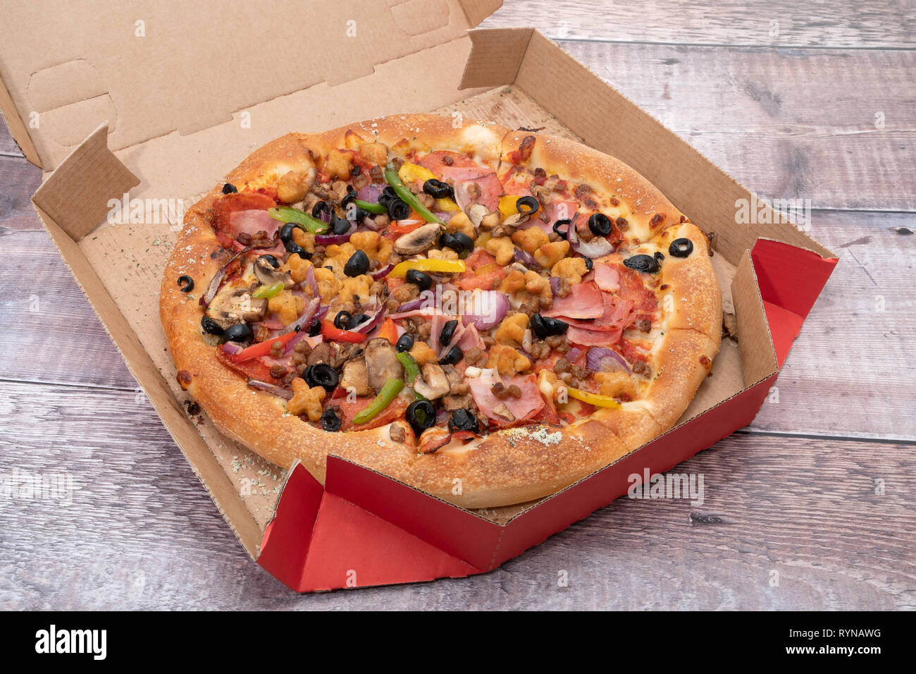 Pizza and delivery box Stock Photo - Alamy