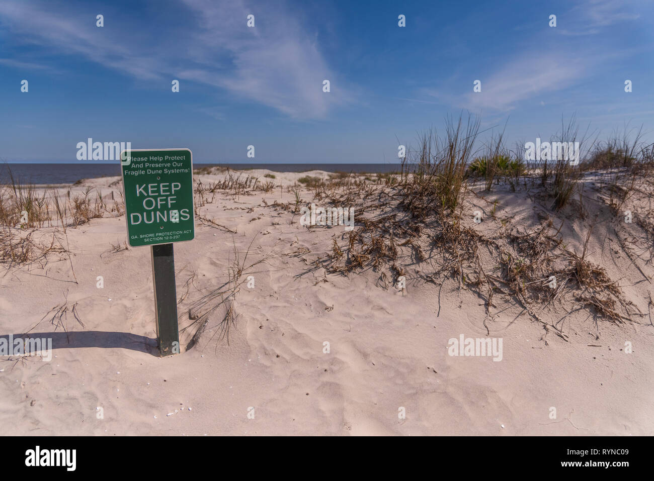 Keep Off Dunes Sign posted on the shoreline of Jekyll Island, Georgia ...