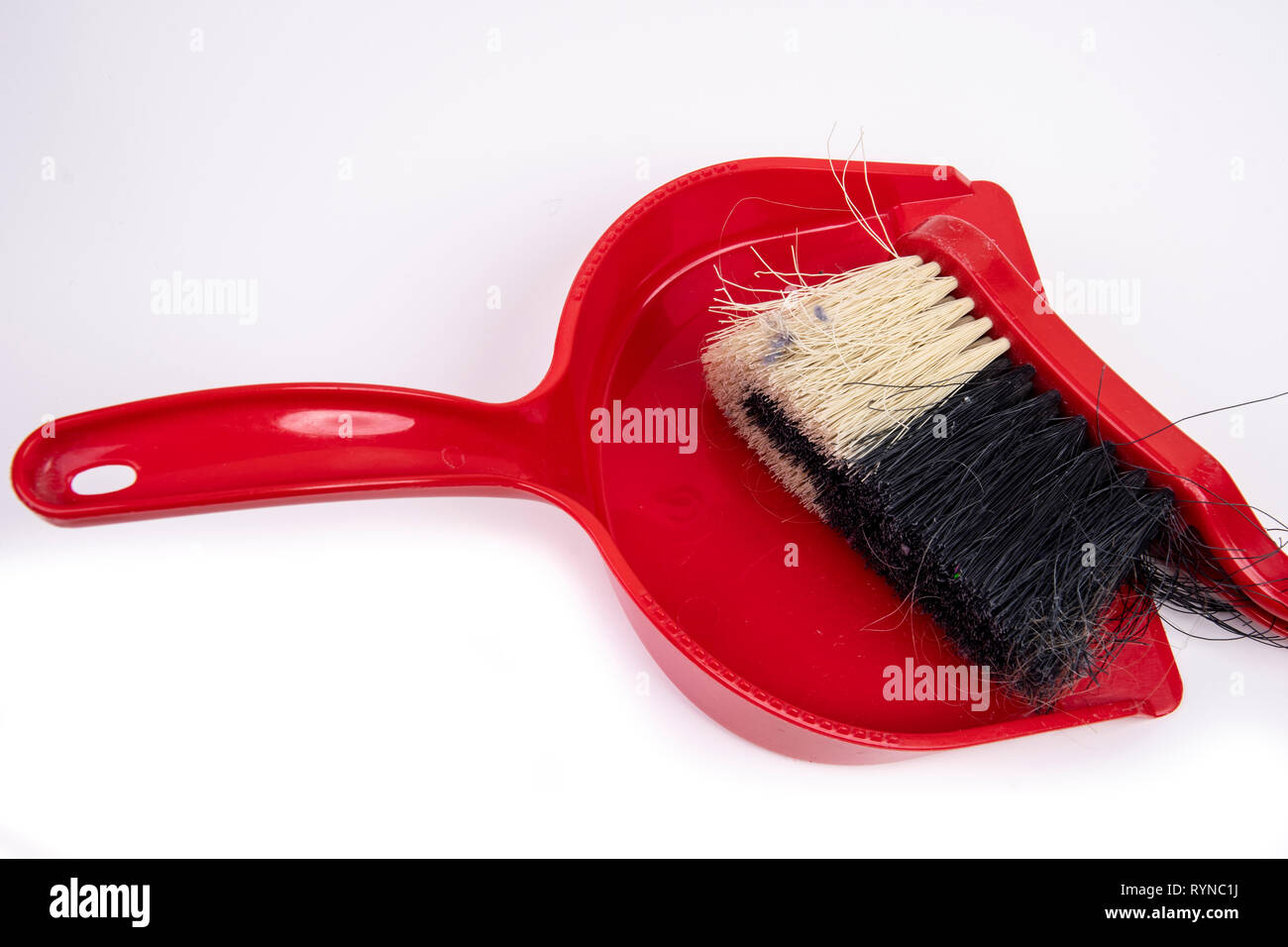 Sweeping shovel and broom Stock Photo - Alamy