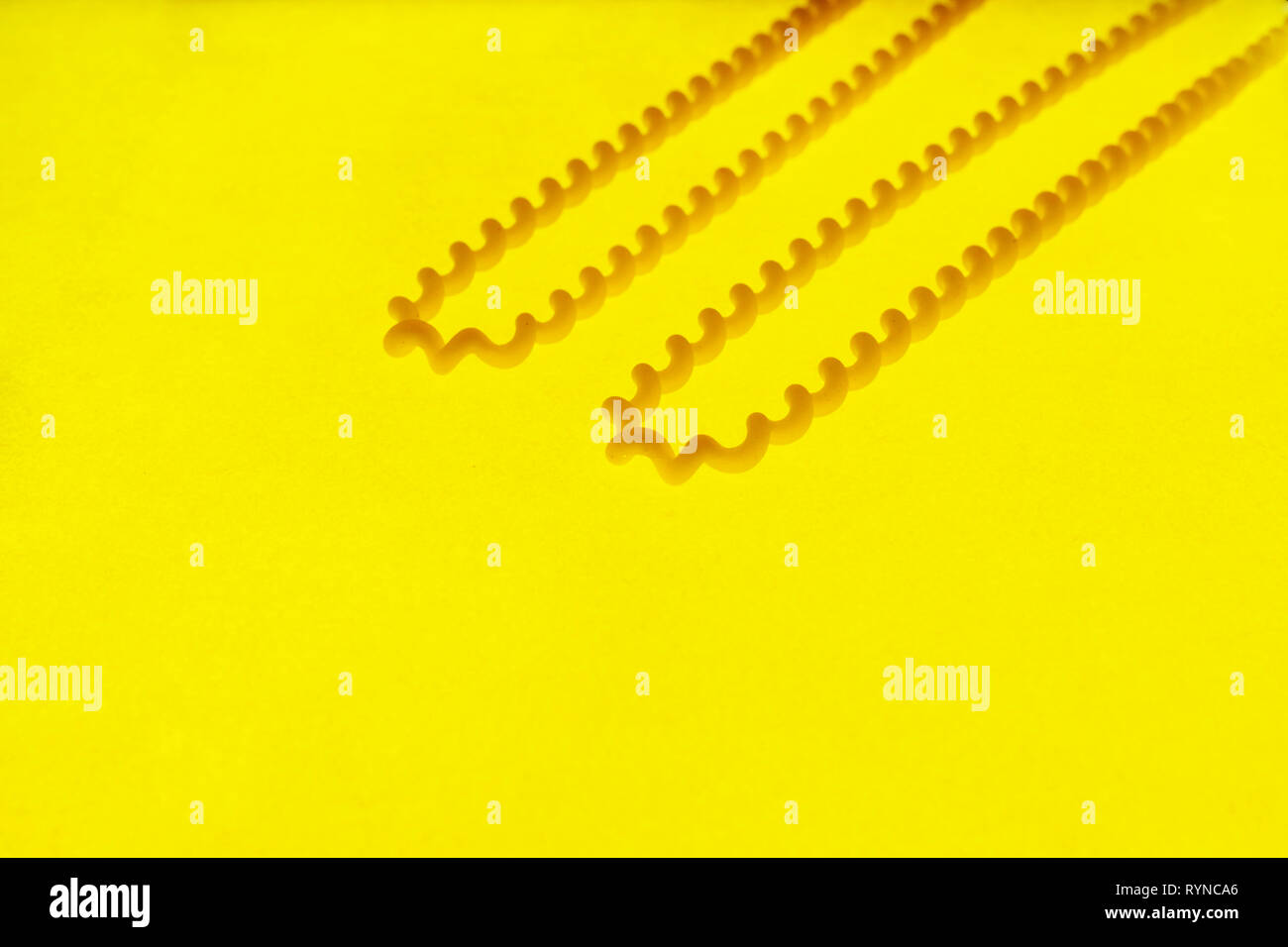 Italian pasta called fusilli , long thin corkscrew shaped pasta on a ...