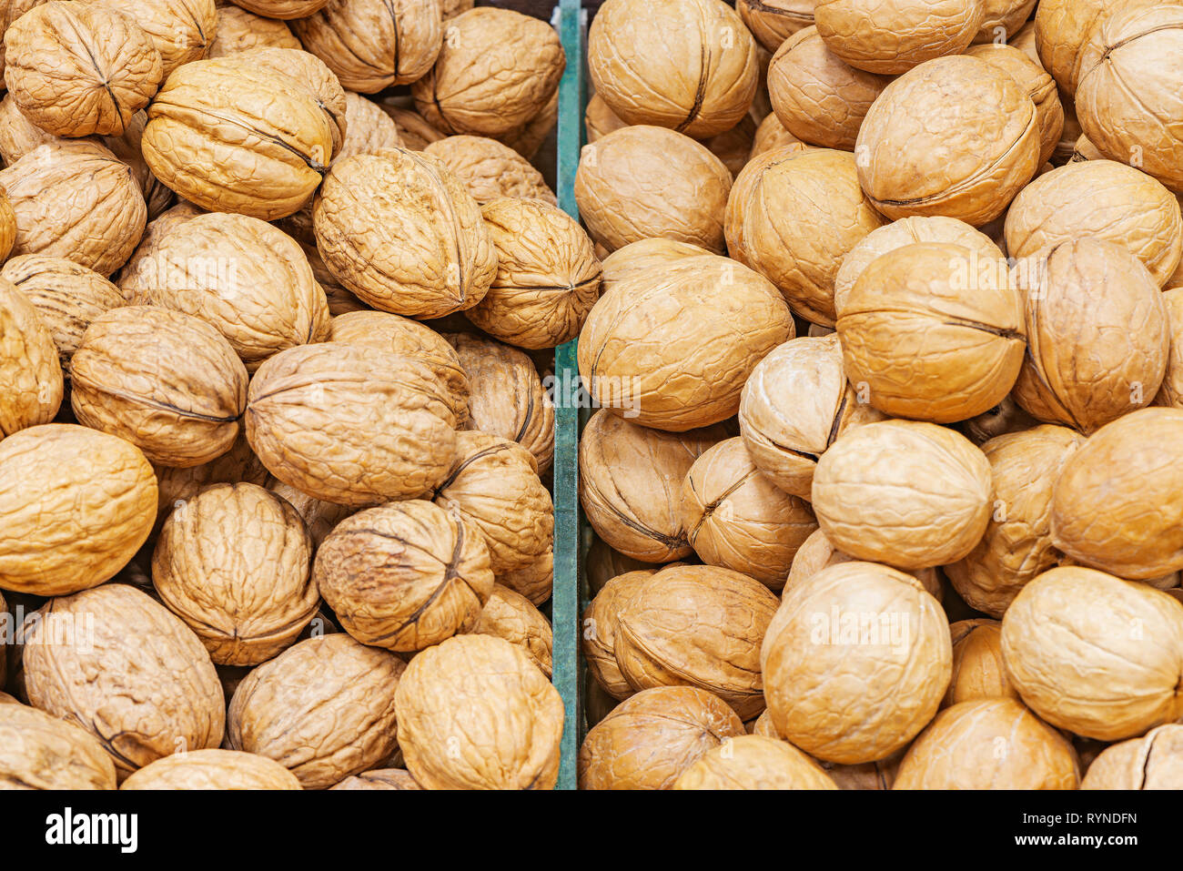 Walnuts in the box inside of the shop Stock Photo - Alamy