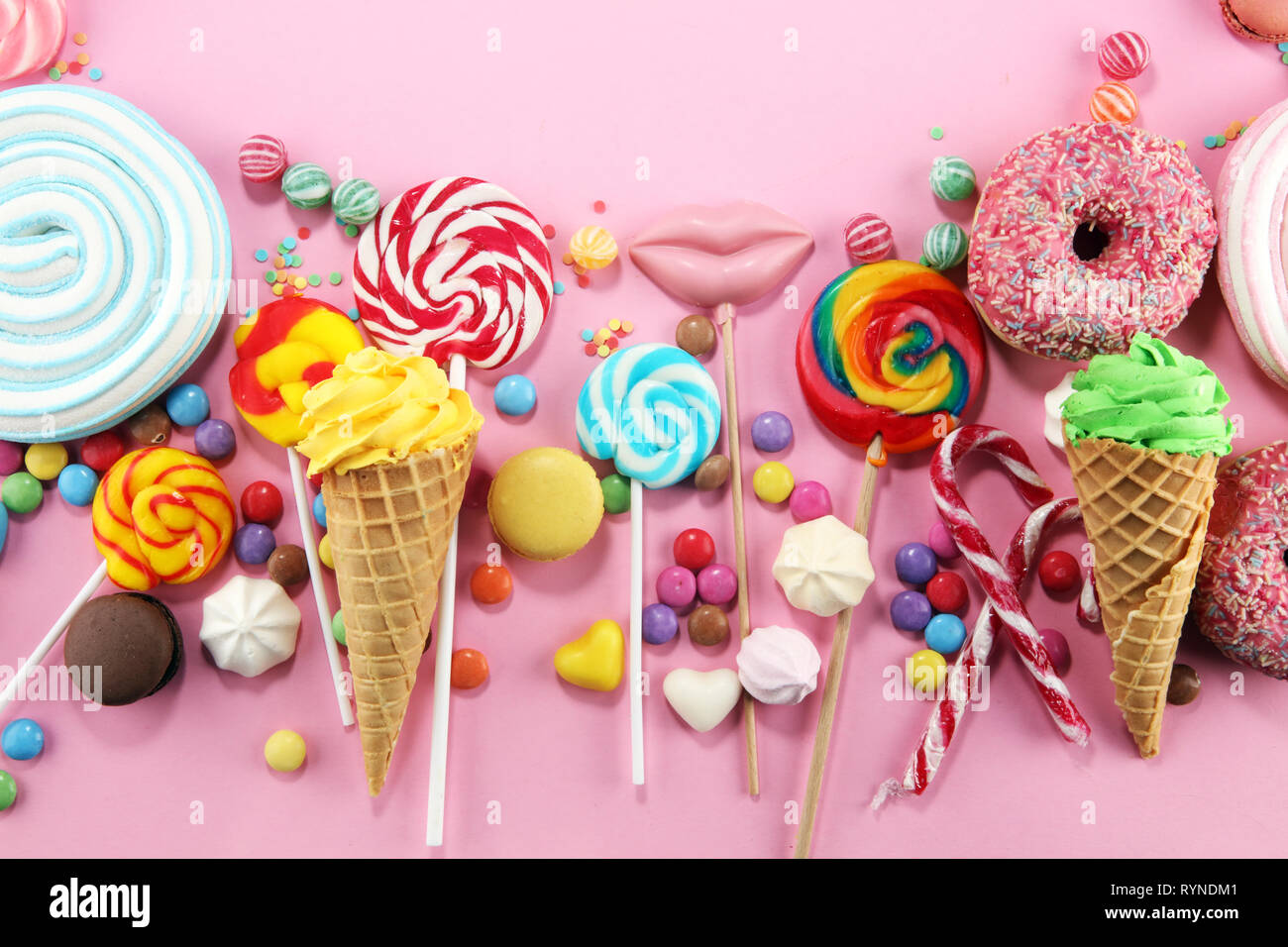 candies with jelly and sugar. colorful array of different childs sweets ...