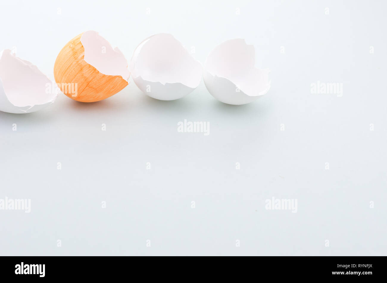 white empty broken egg shells with colored ones Stock Photo - Alamy