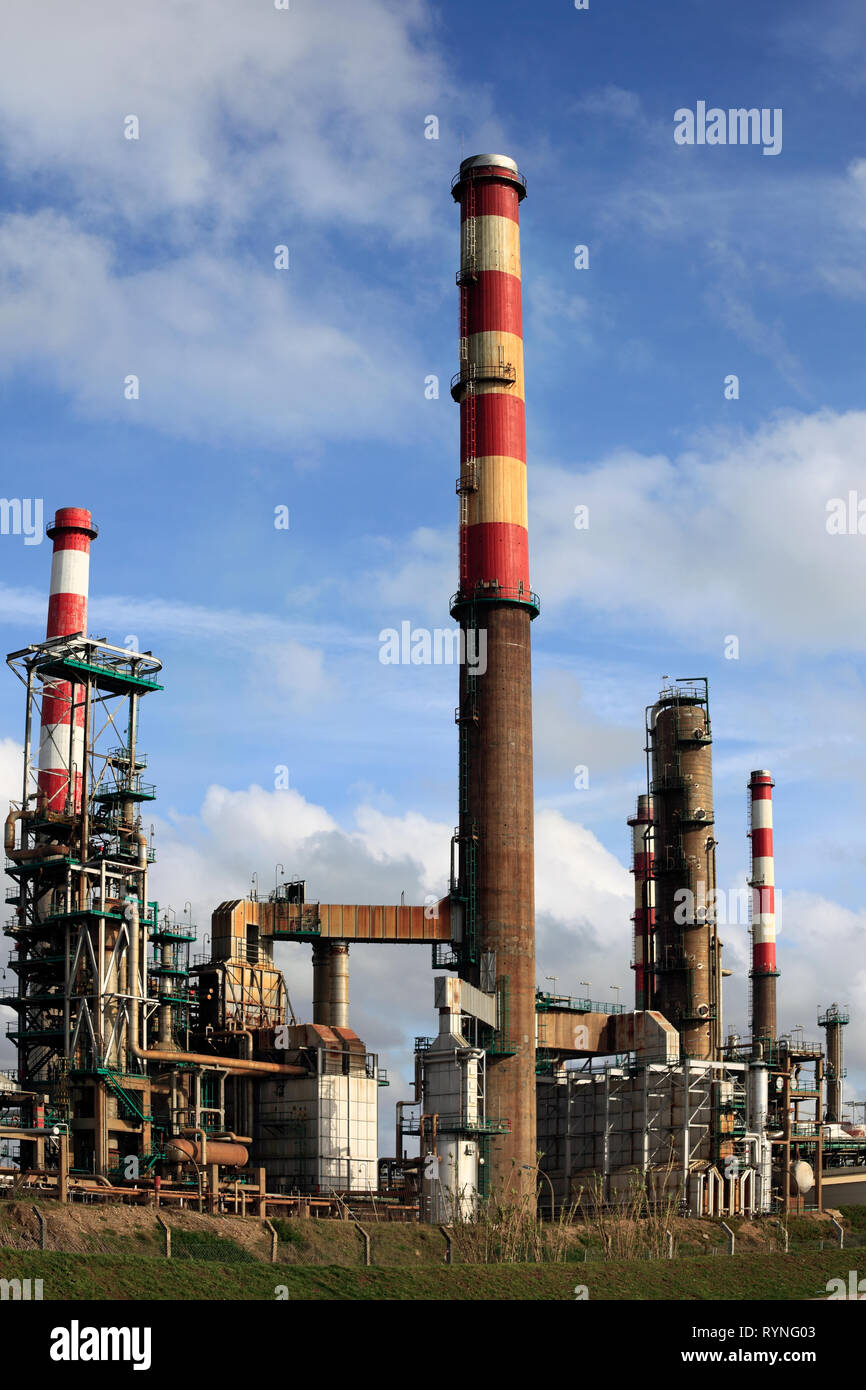 Industrial pipes and chimneys from a big oil refinery Stock Photo - Alamy