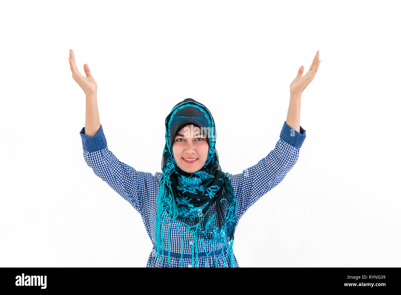 Muslim islam woman with hijab putting her hand up Stock Photo - Alamy