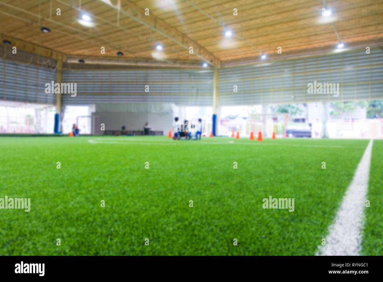 Indoor soccer training field blur abstract for background Stock Photo ...