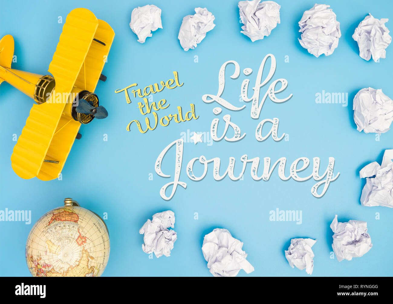 Travel The world Life is a journey concept with paper cloud and toy ...