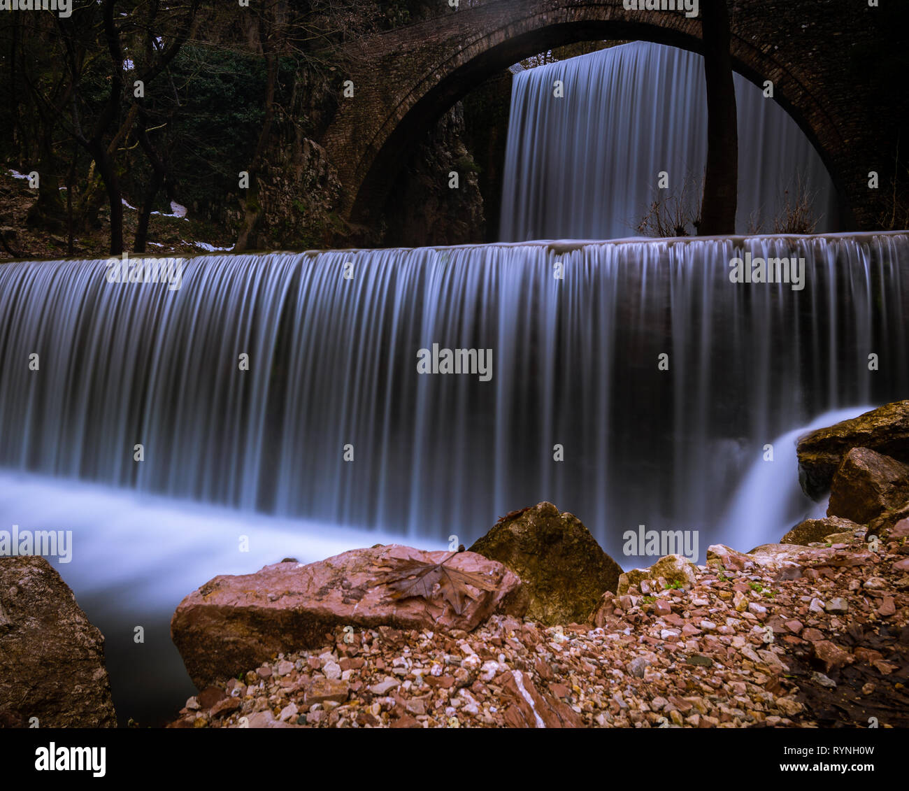 Stone bridge waterfall hi-res stock photography and images - Alamy