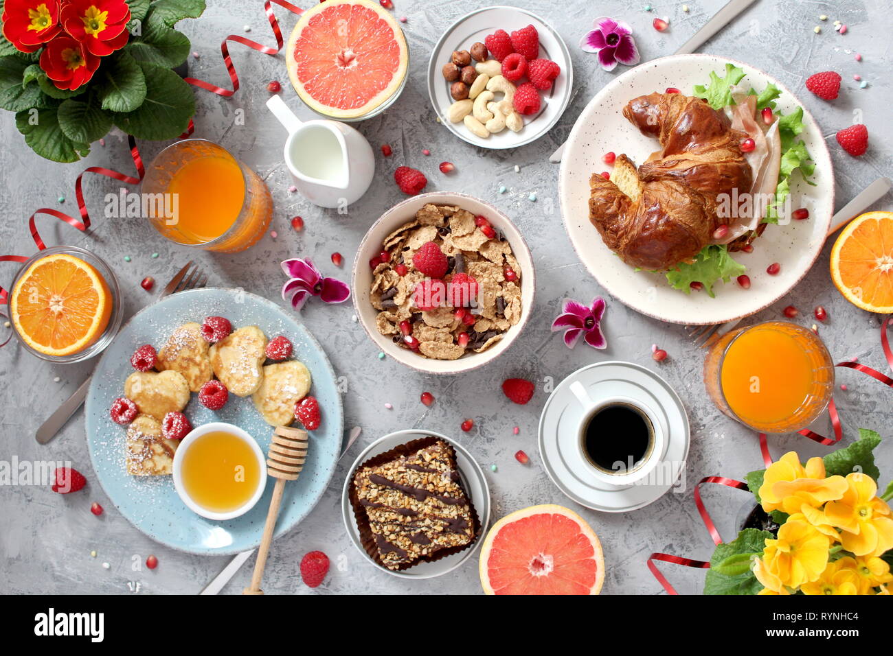 Breakfast food table. Festive brunch set, meal variety with pancakes ...