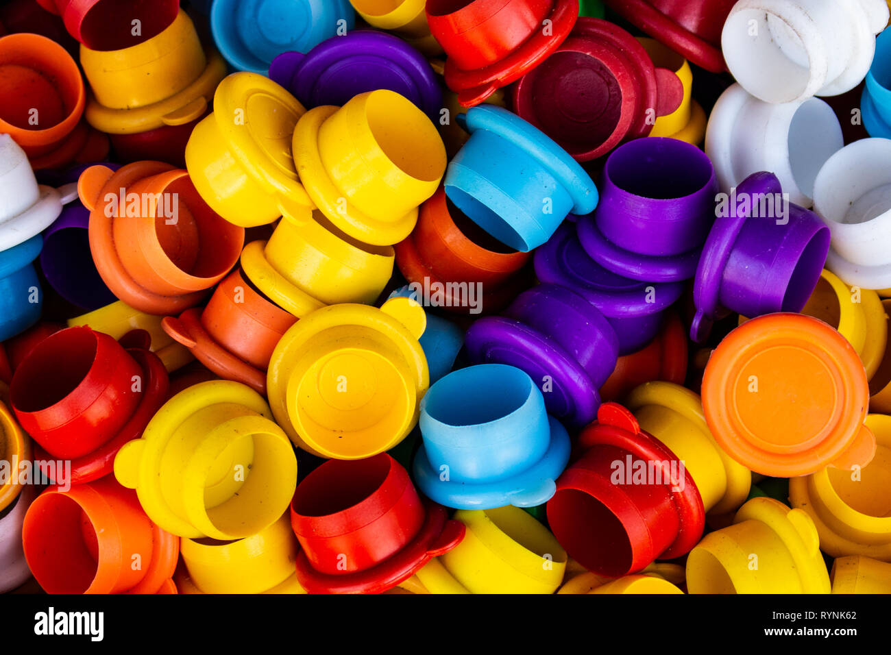 Numerous rubber caps of different colors. Grouping of bottle caps Stock ...