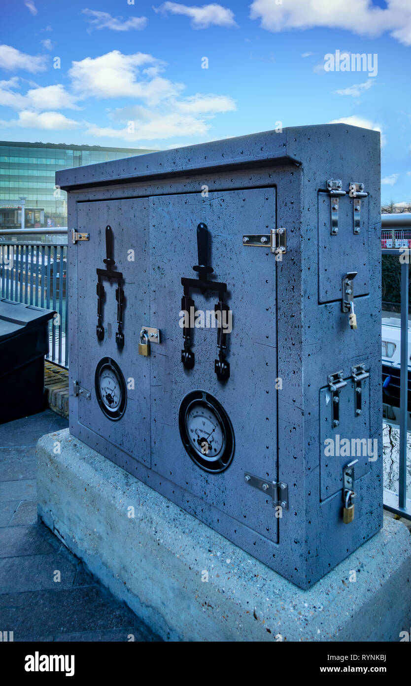 Large artistic metal box with brass hinges and many padlocks with dials ...