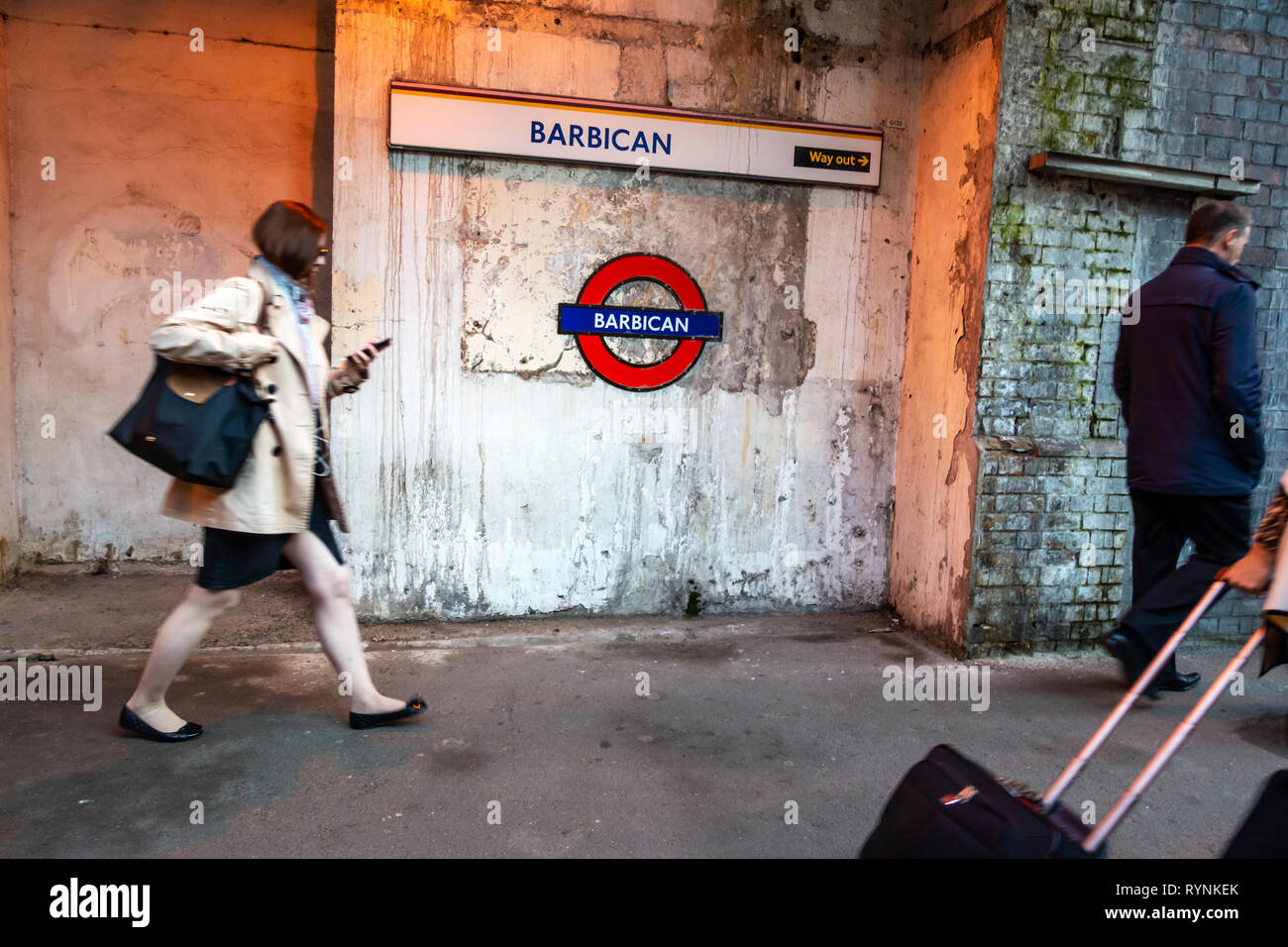 Iconic circular London Tube sign on the underground platform at ...