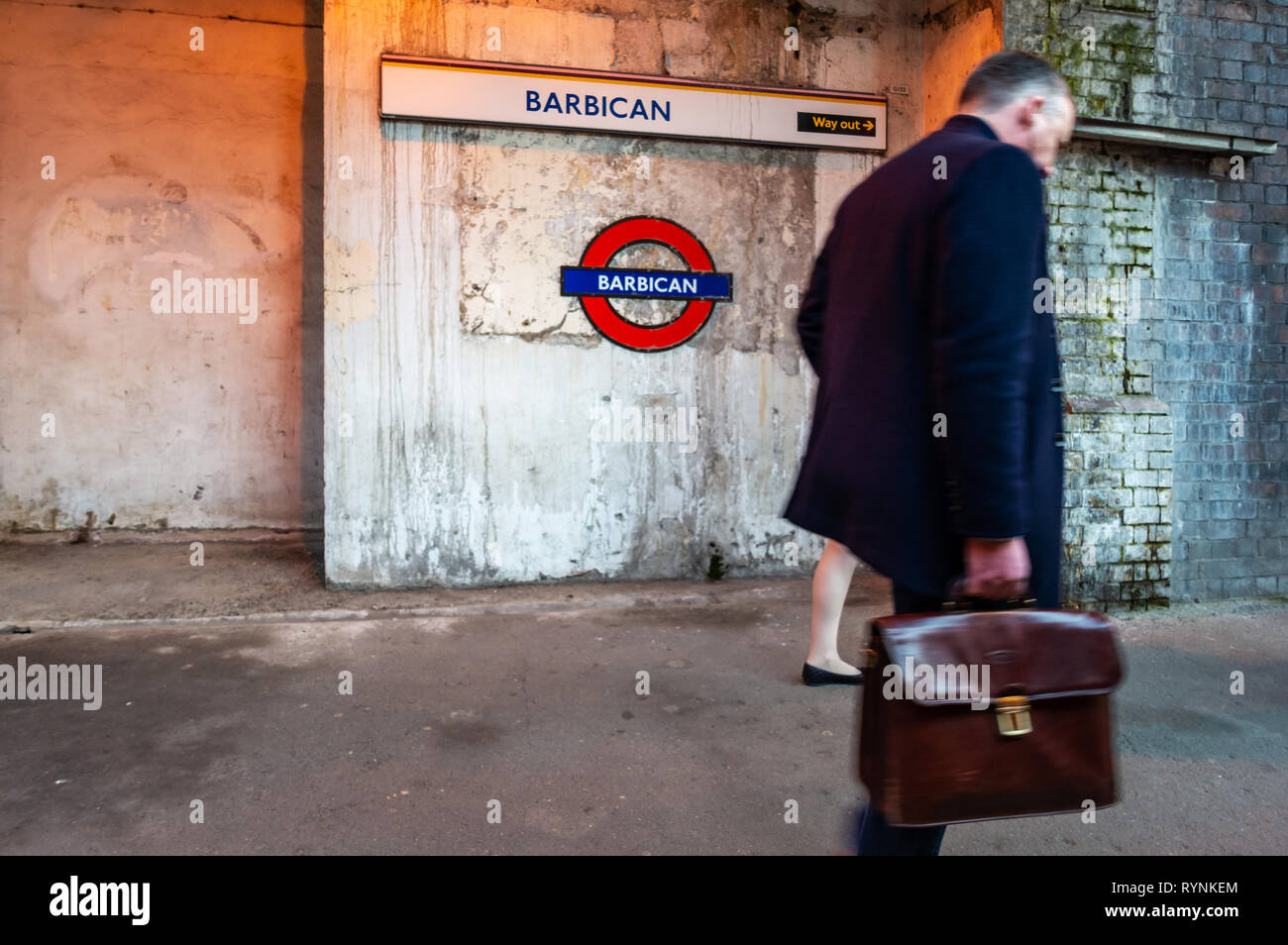 Iconic circular London Tube sign on the underground platform at ...