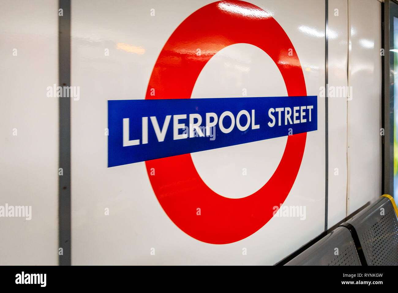 Iconic circular London Tube sign on the underground platform at ...
