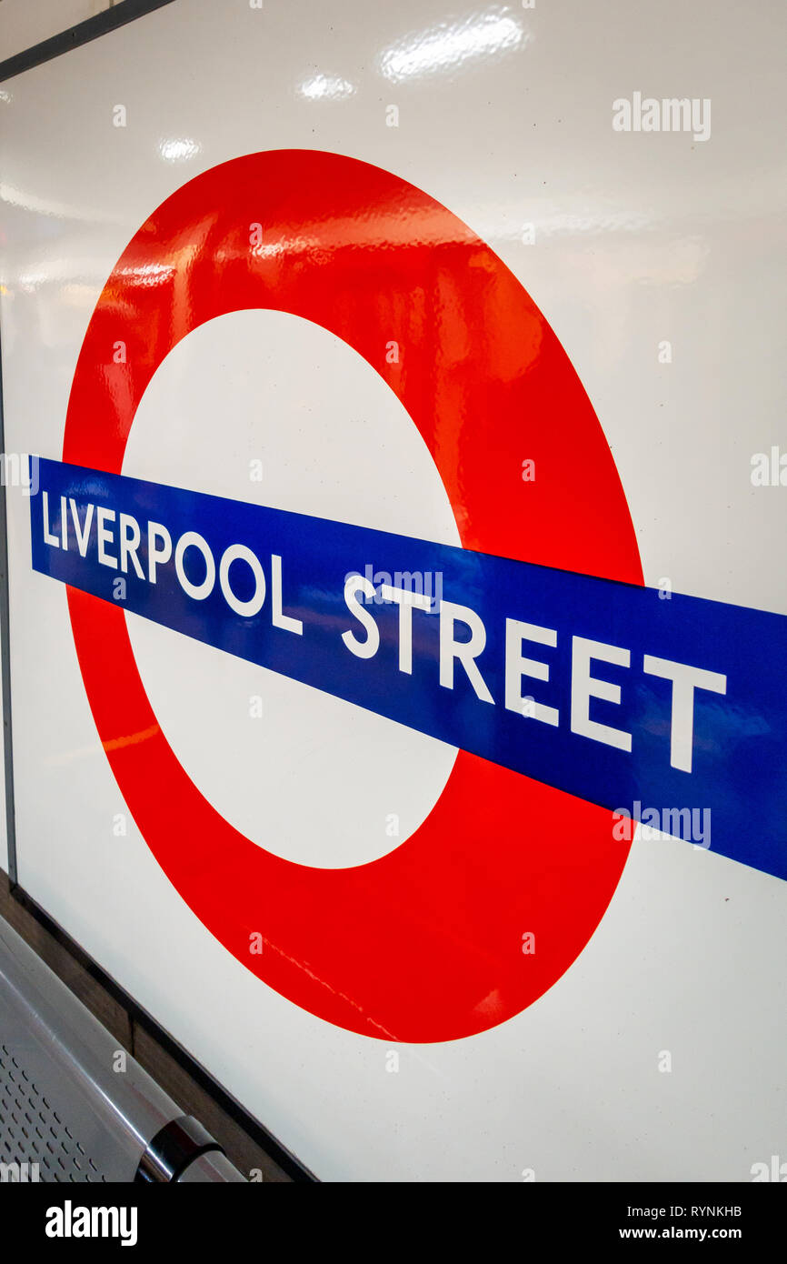 Iconic circular London Tube sign on the underground platform at ...