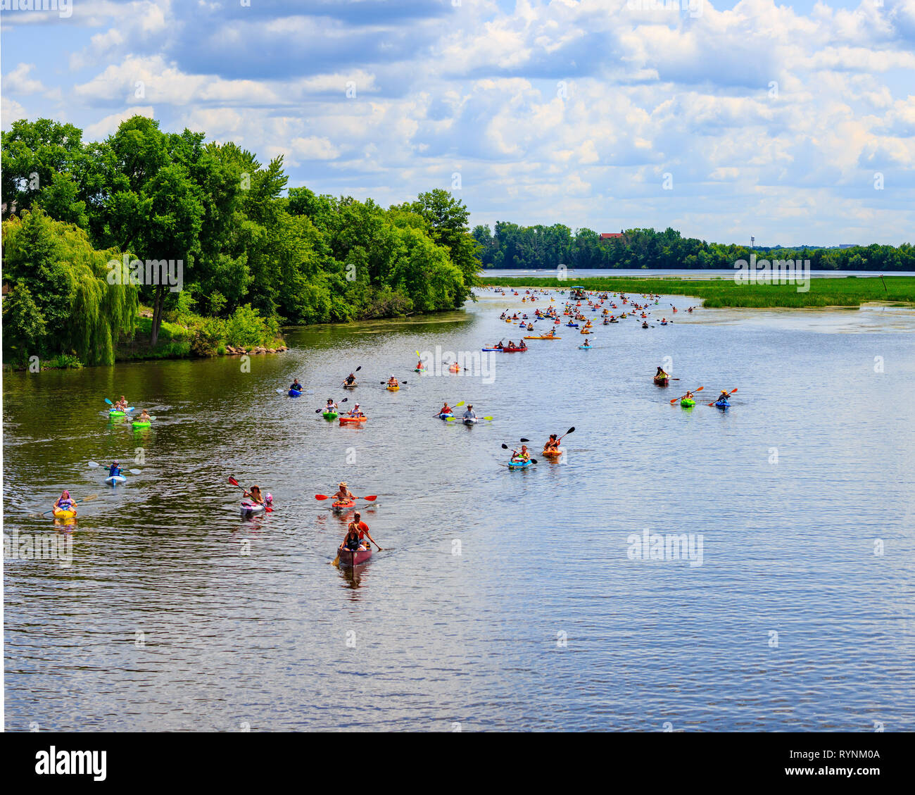 Paddlers cruising at the 4th Annual Paddle Pub Crawl on Lake Wausau in ...