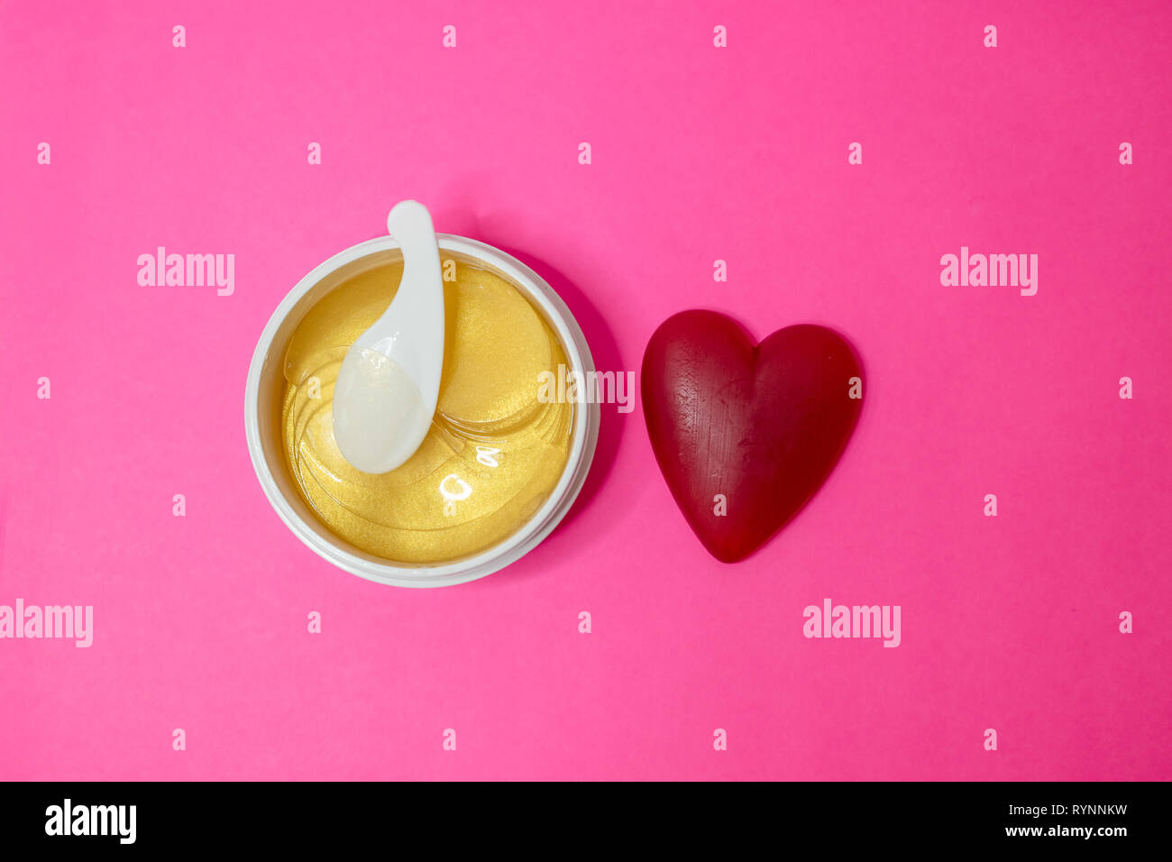 Plastic beauty jar with face mask, container with golden anti aging ...