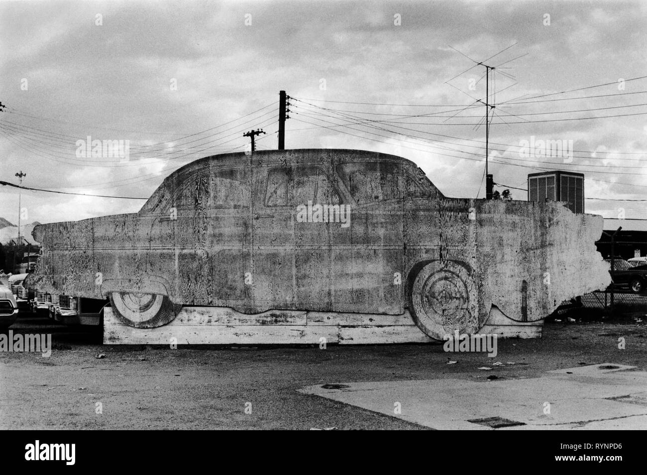 Old wooden cut out advertising board for a car. Gallup New Mexico USA ...