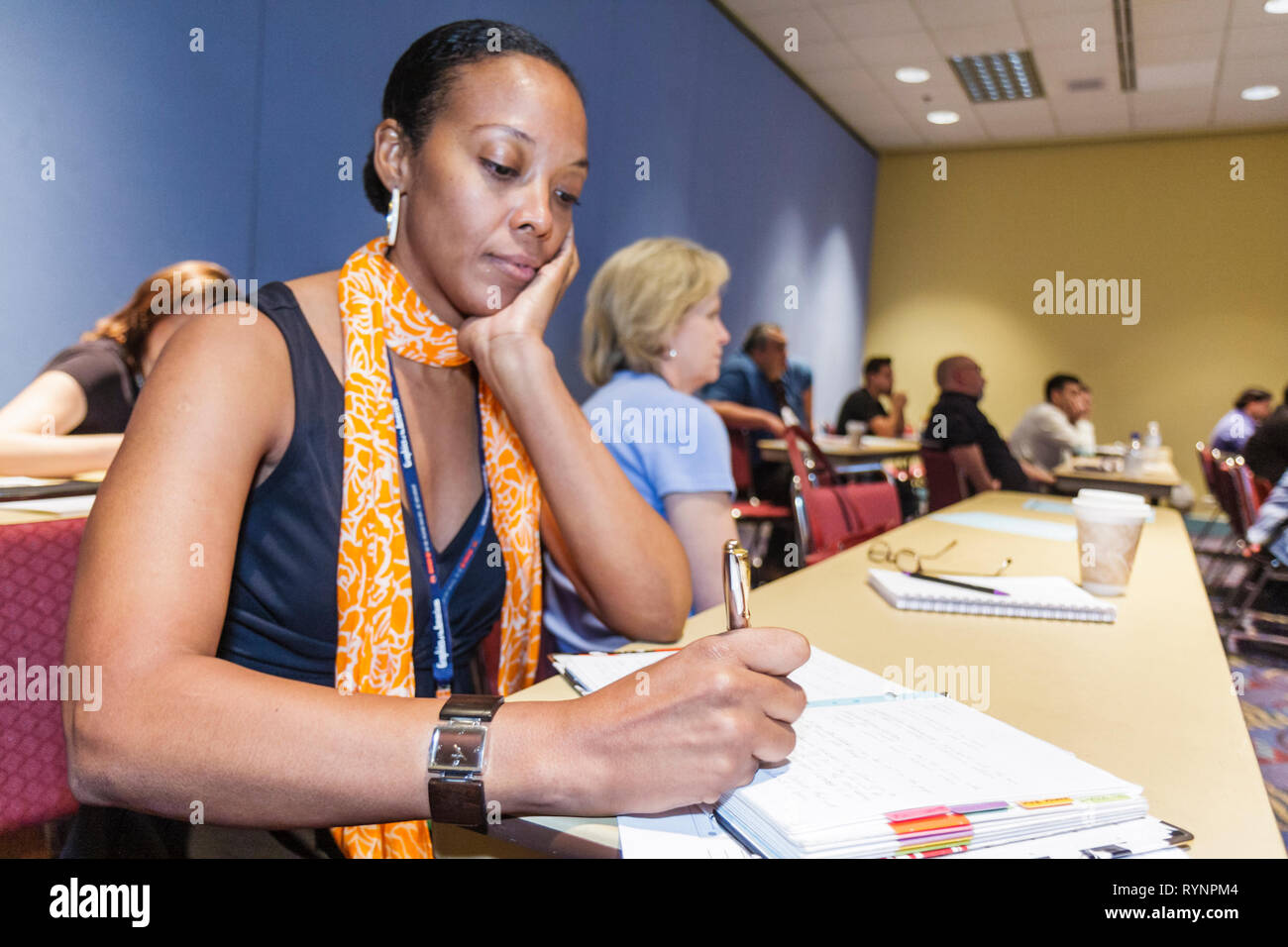 Person listening taking notes hi-res stock photography and images - Alamy