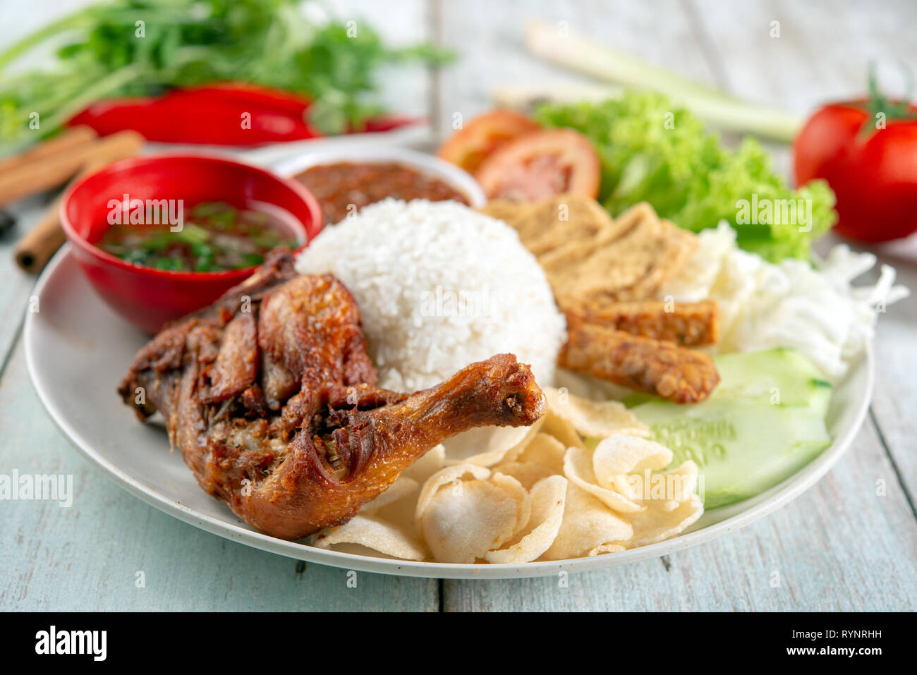 Nasi lemak kukus with fried drumstick, popular traditional Malaysian ...