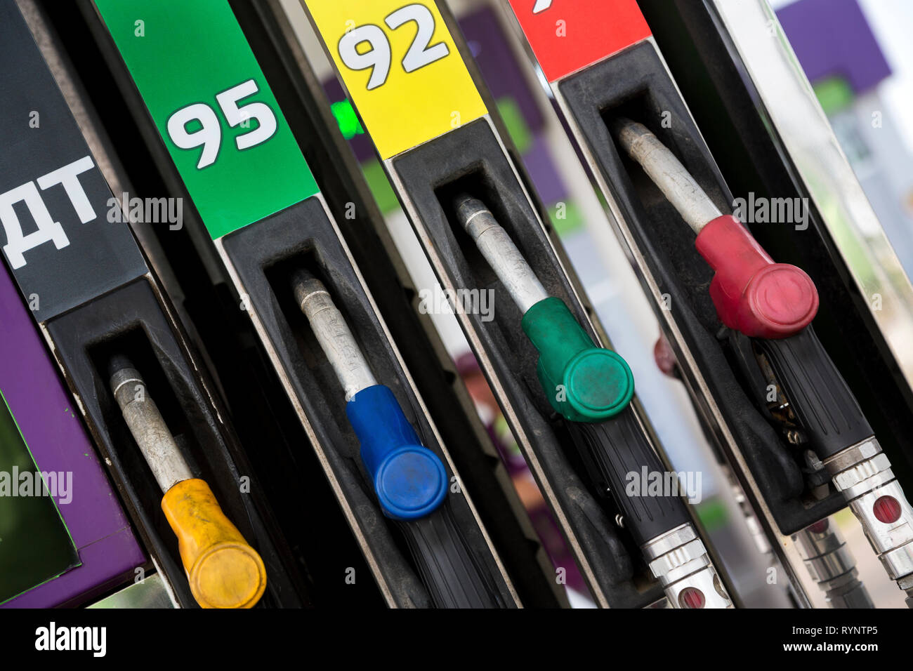 Filling guns with gasoline of different octane numbers and diesel fuel ...